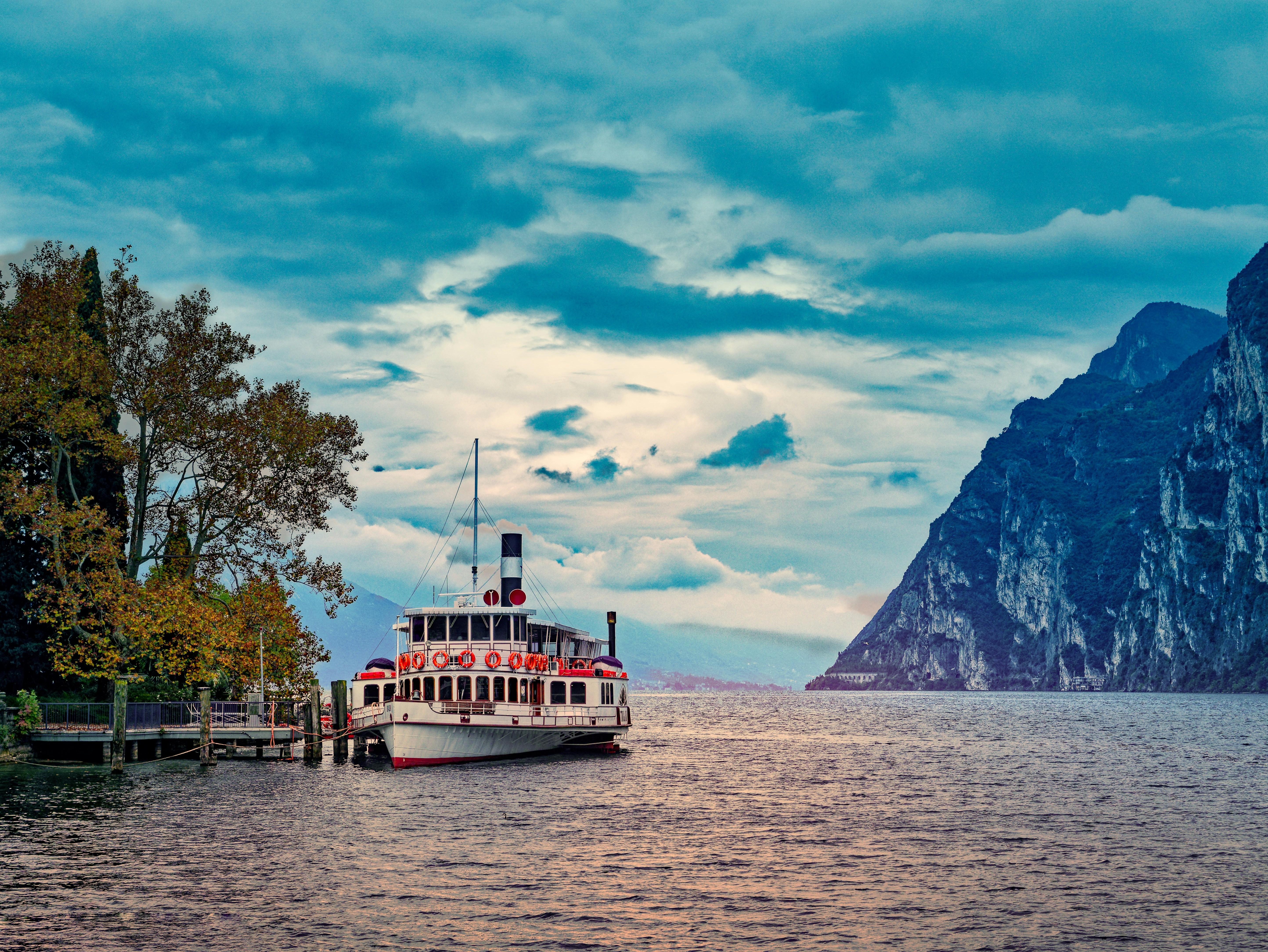 Dockside Steamliner Drifting Toward Alpine Light