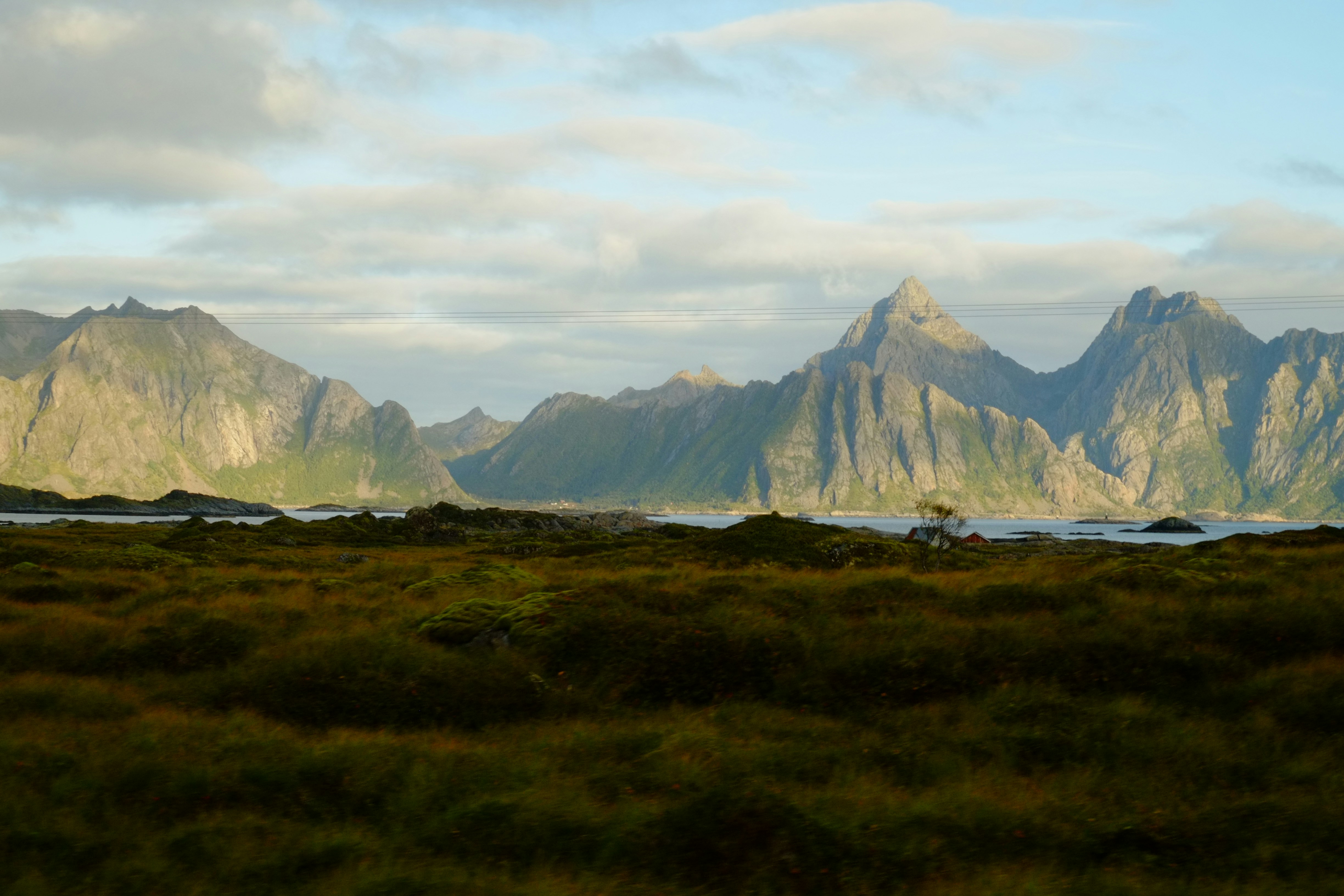 Crown of jagged peaks over a windswept moor