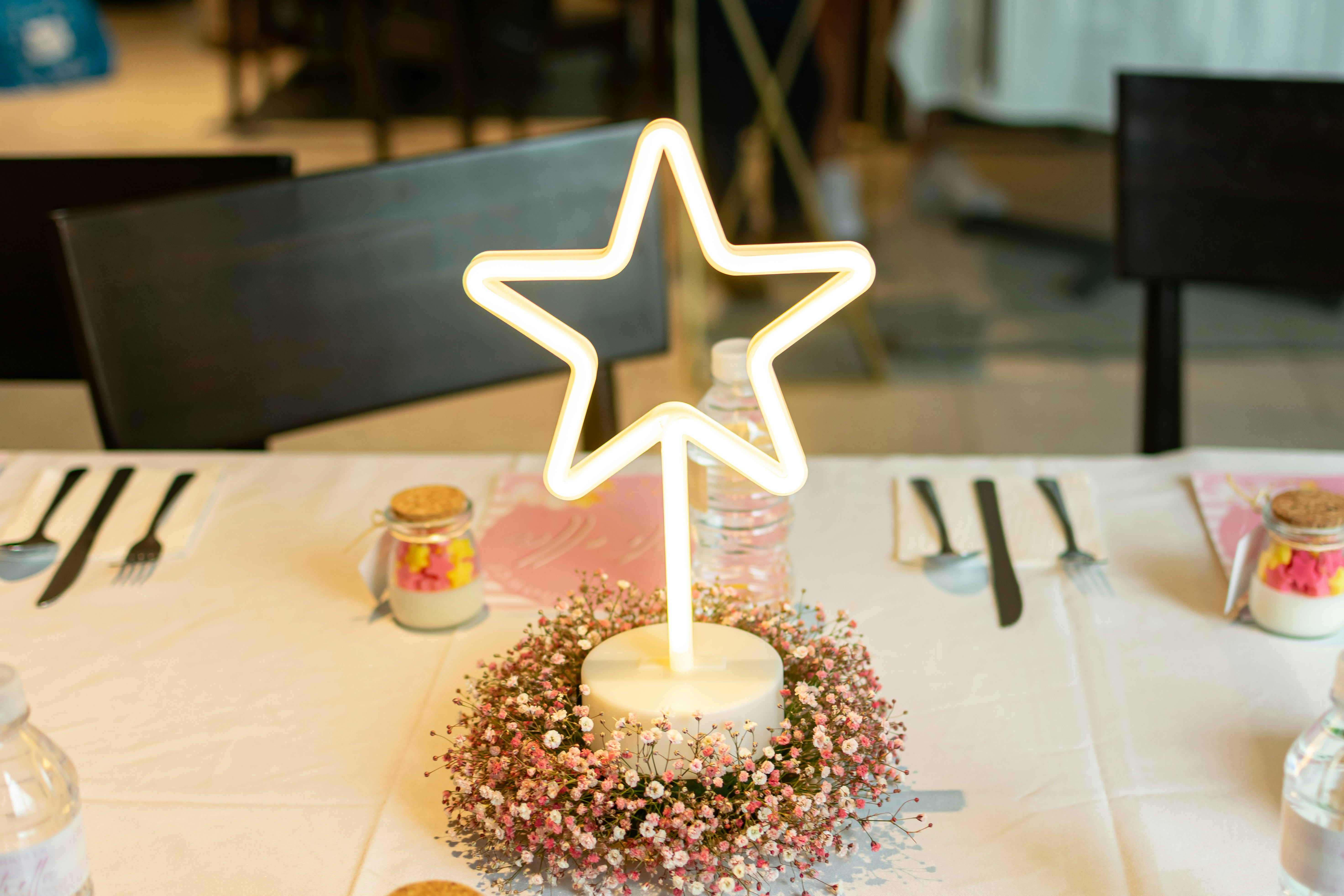 Neon Star Crowning a Festive Table Centerpiece
