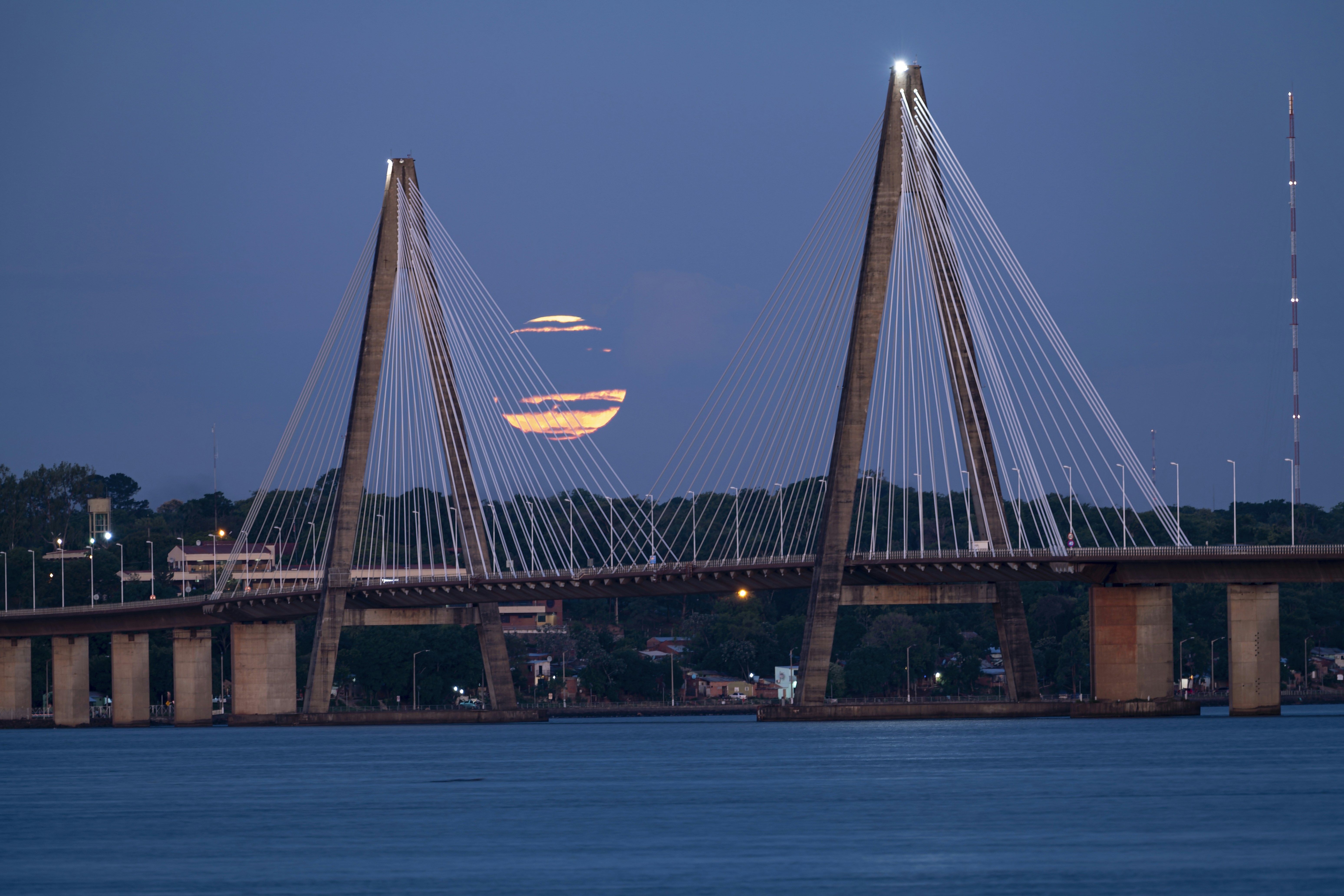 Moonlit Cable-Stayed Bridge Over Calm Waters