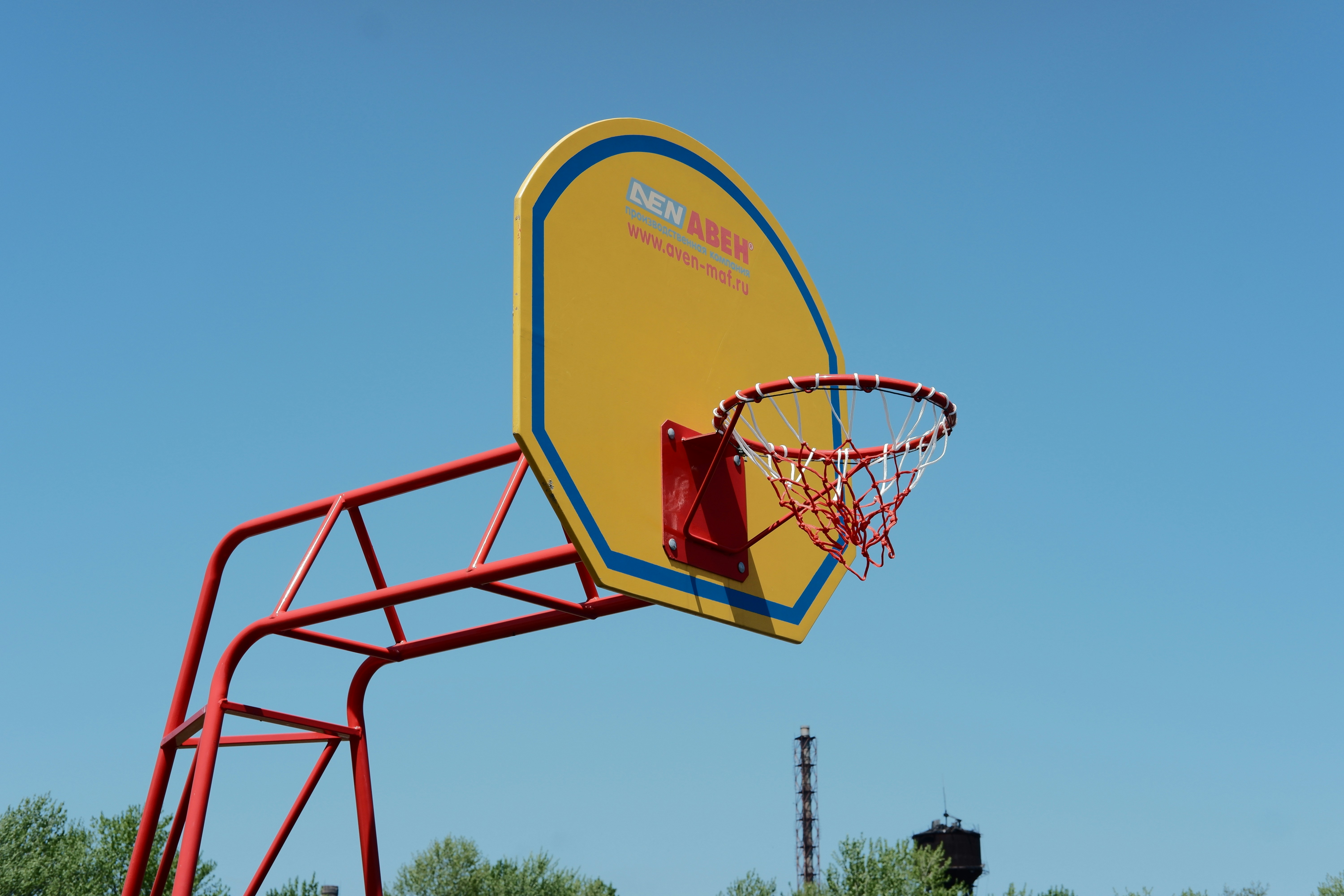 Yellow Backboard Under a Clear Blue Sky