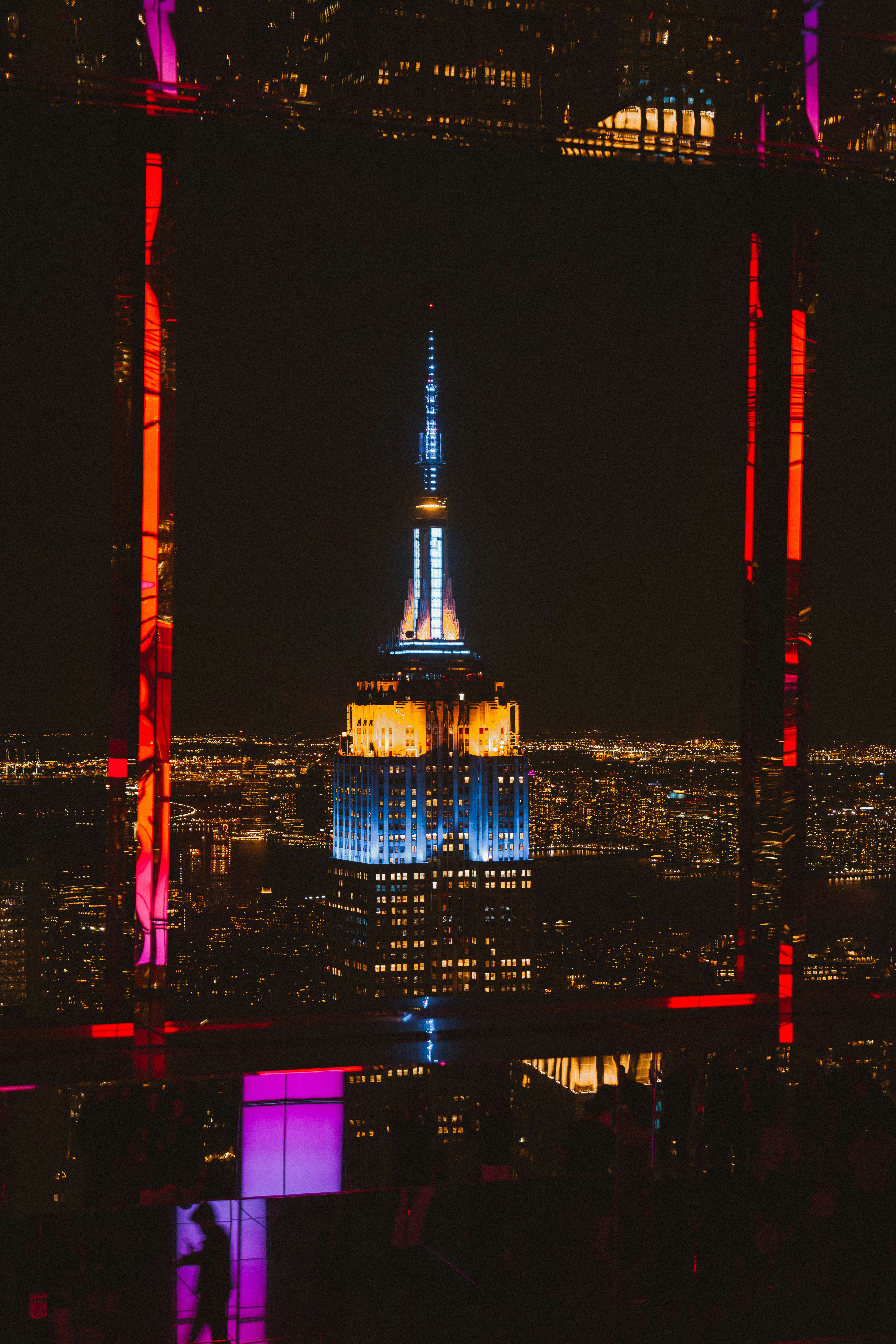 Midnight Spire: Empire State Glow Through Neon Frames
