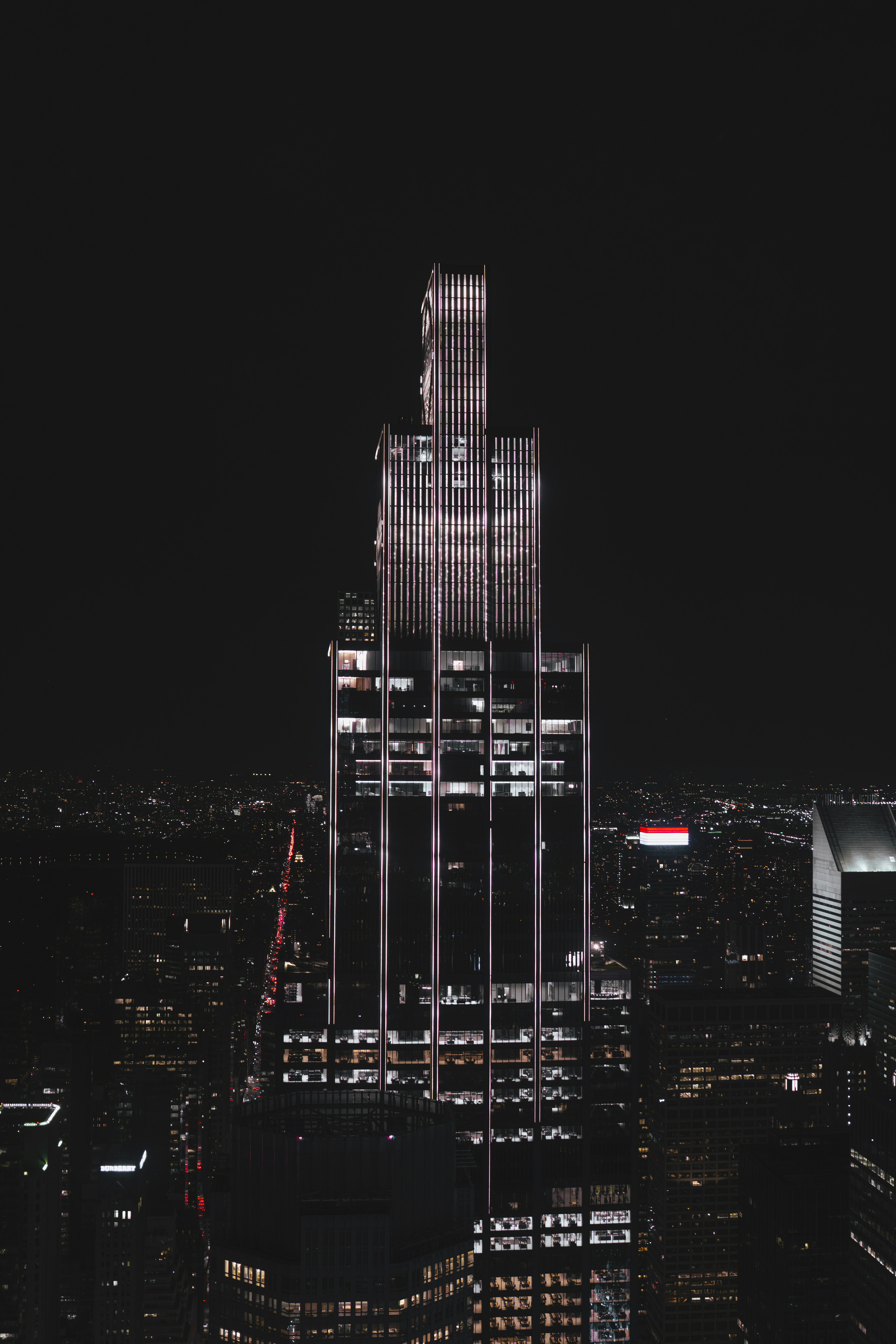 Midnight Skyscraper: Neon Stripes on a Silent Horizon