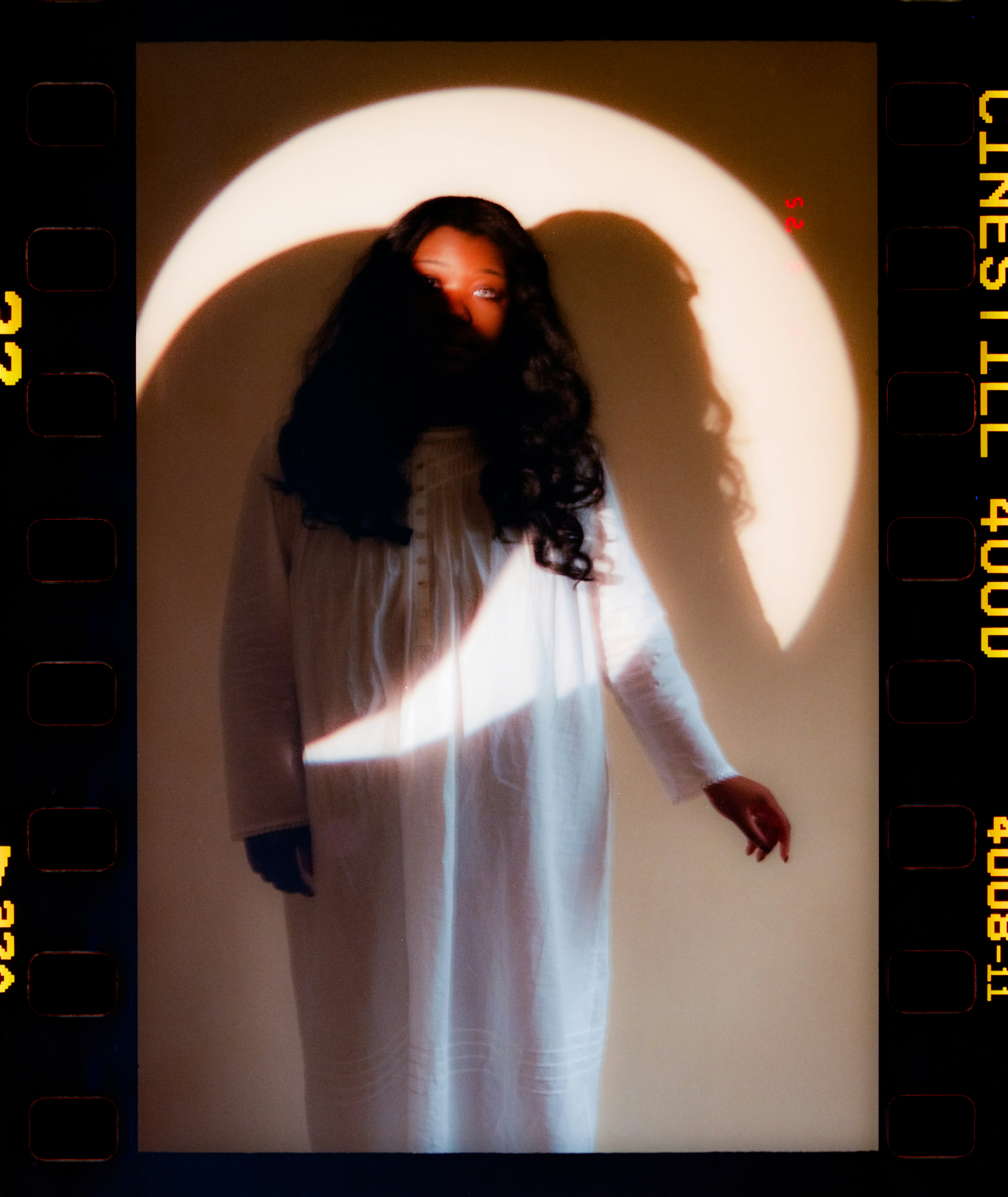 Halo in White: A Portrait Wrapped in Light and Shadow