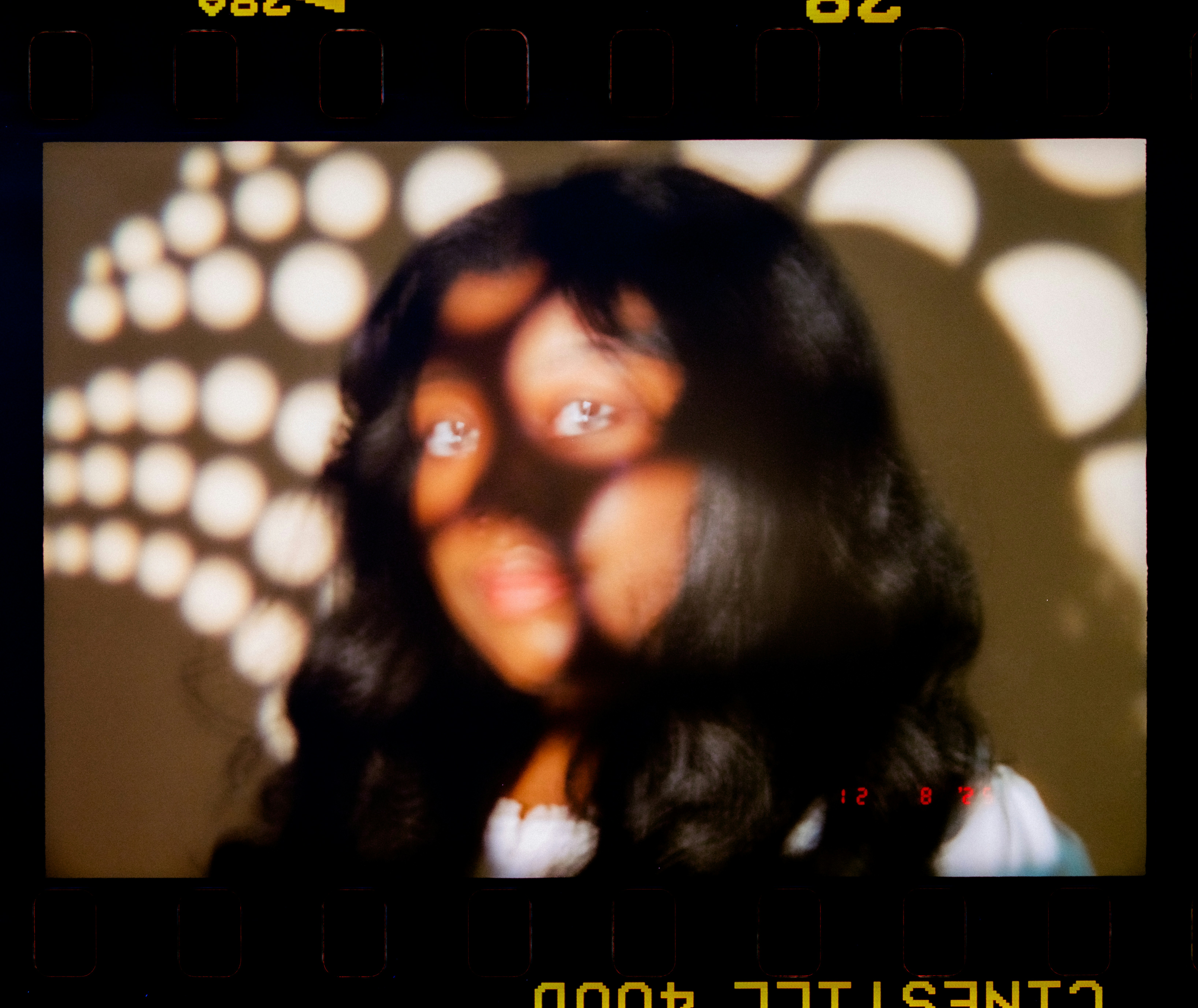 Blurred Halo: A Portrait Lost in Light and Shadow