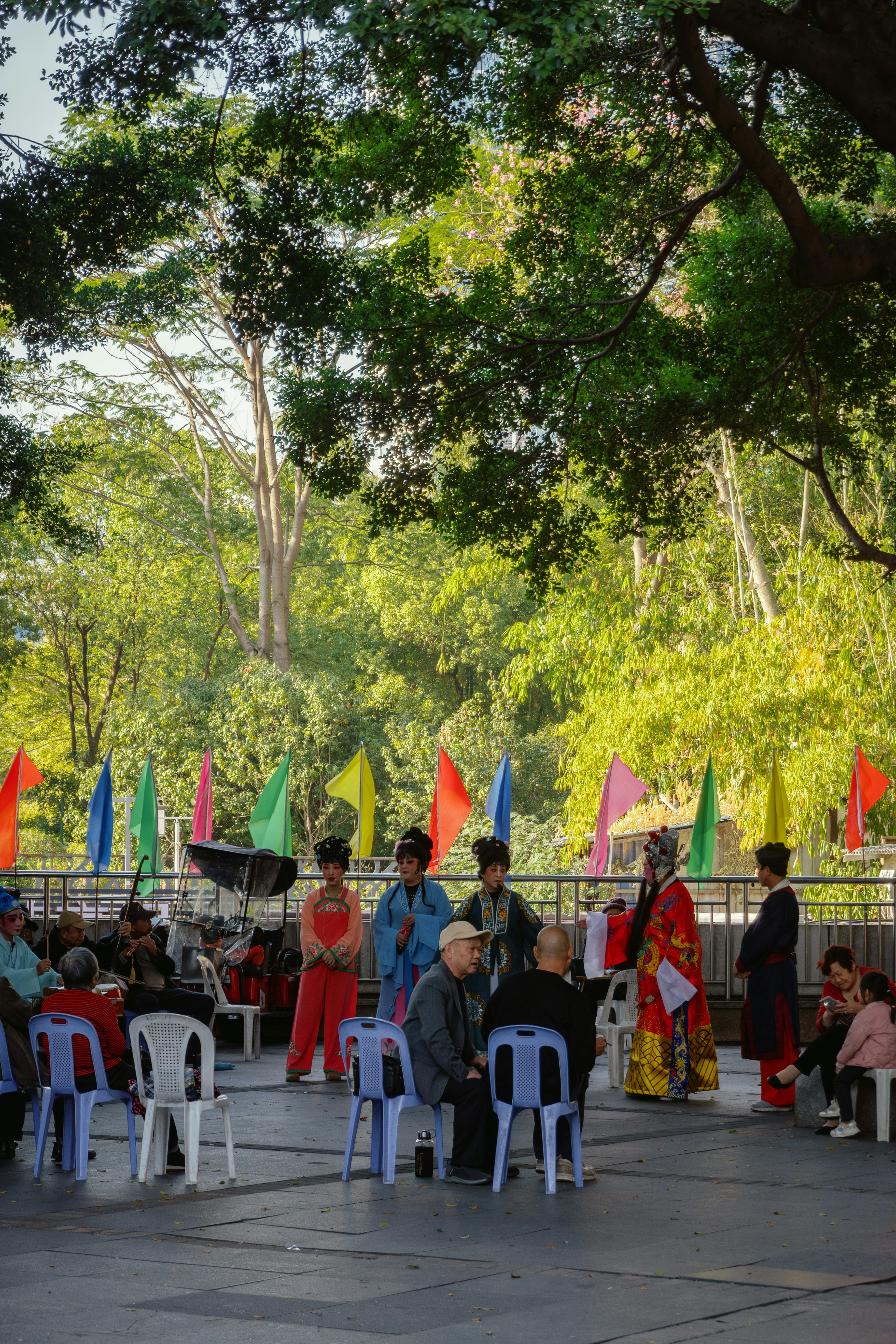 Colorful Circle: Community Gathering Under Dappled Light