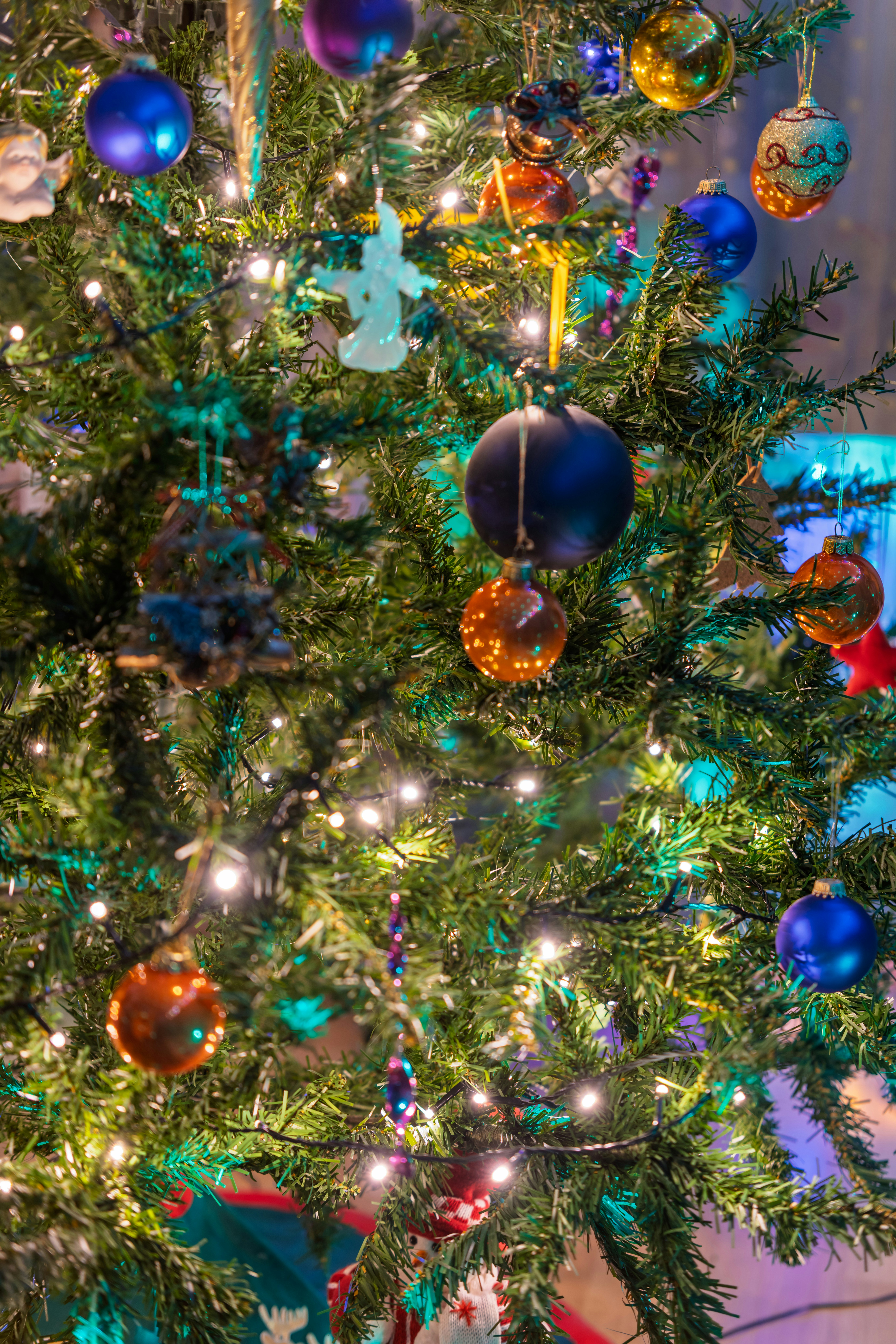 Glowing Ornaments on a Cozy Christmas Tree