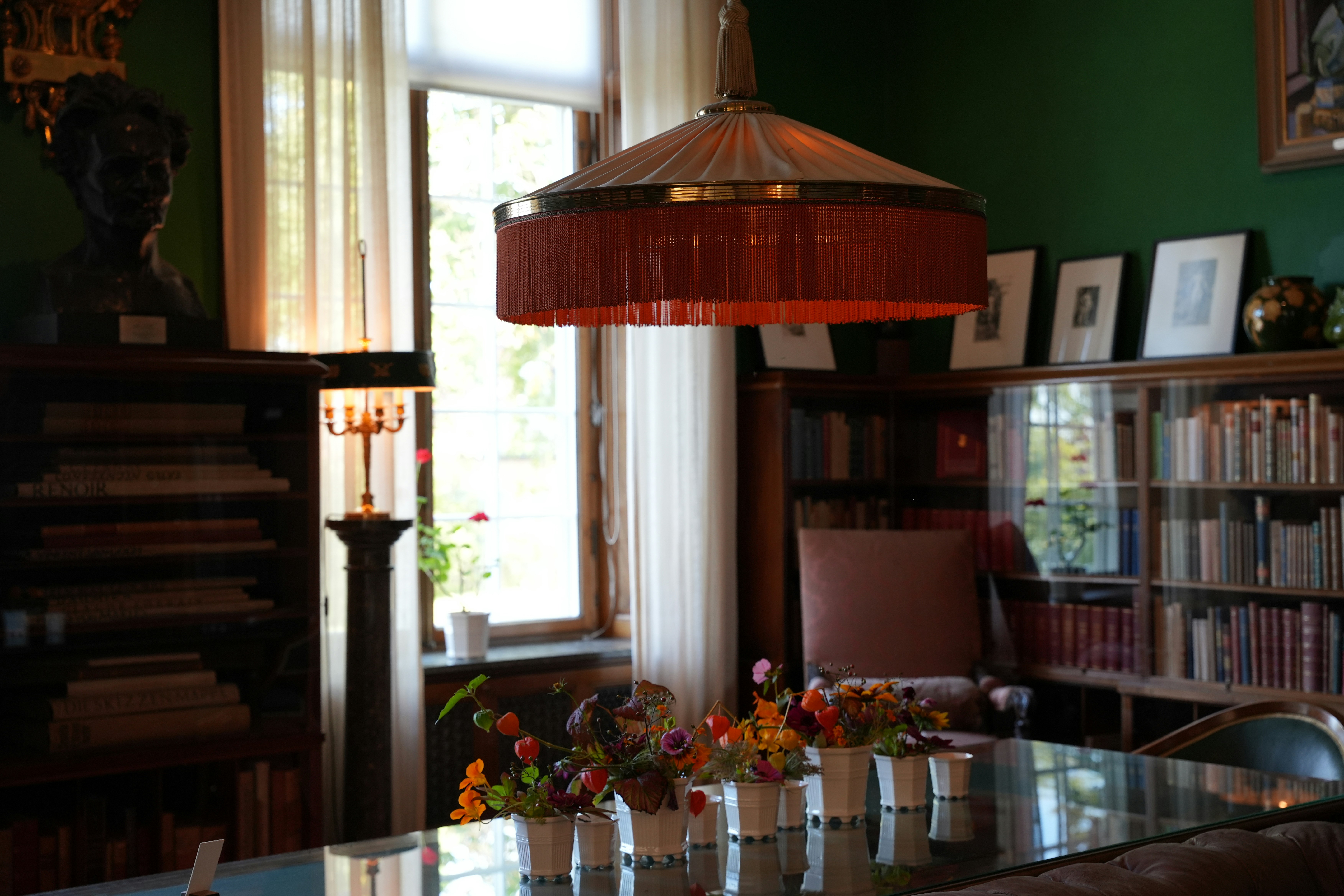 Amber Glow Over a Cozy Library Dinner Table