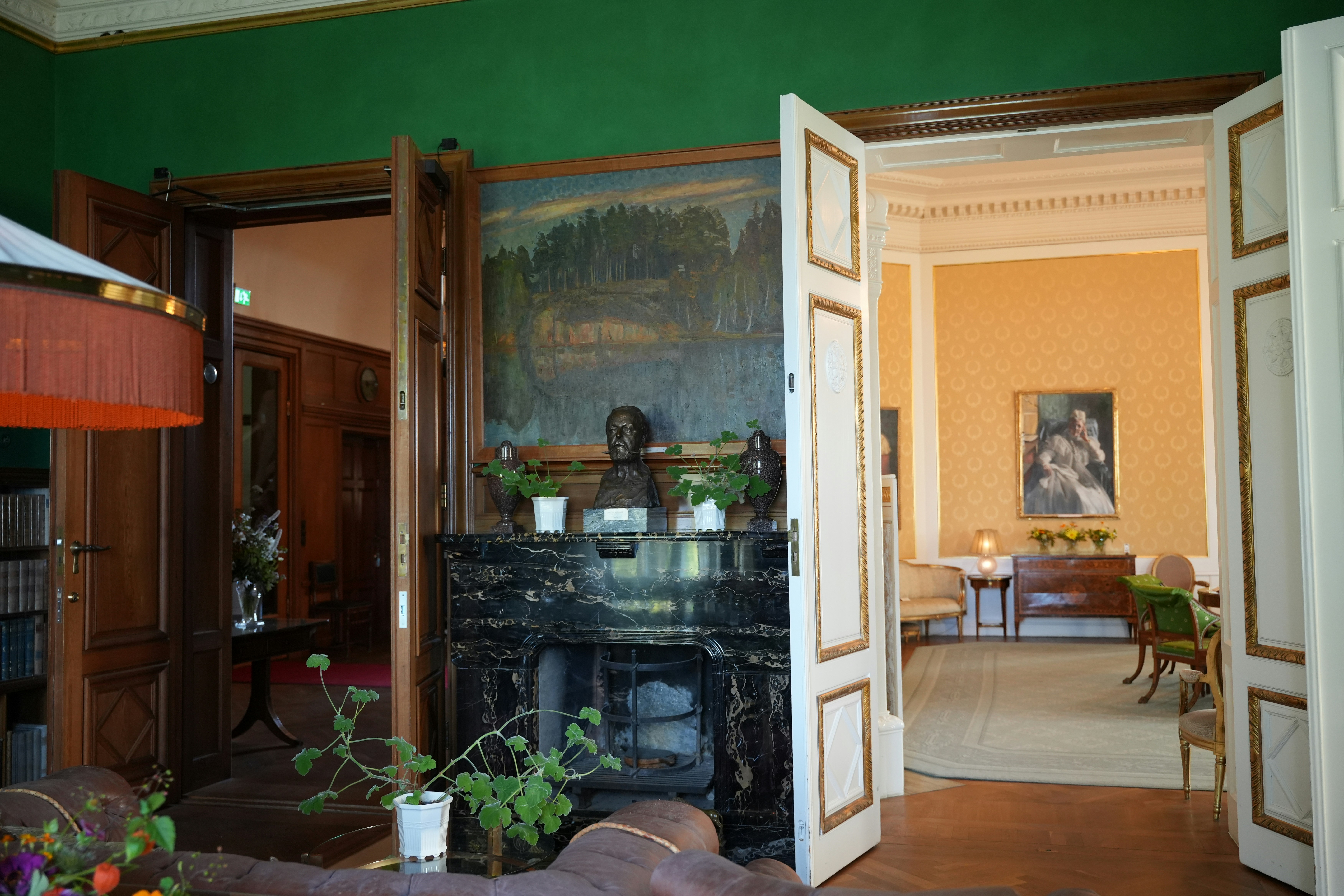 Open Doorway to a Quiet Salon: A Tapestry of Rooms