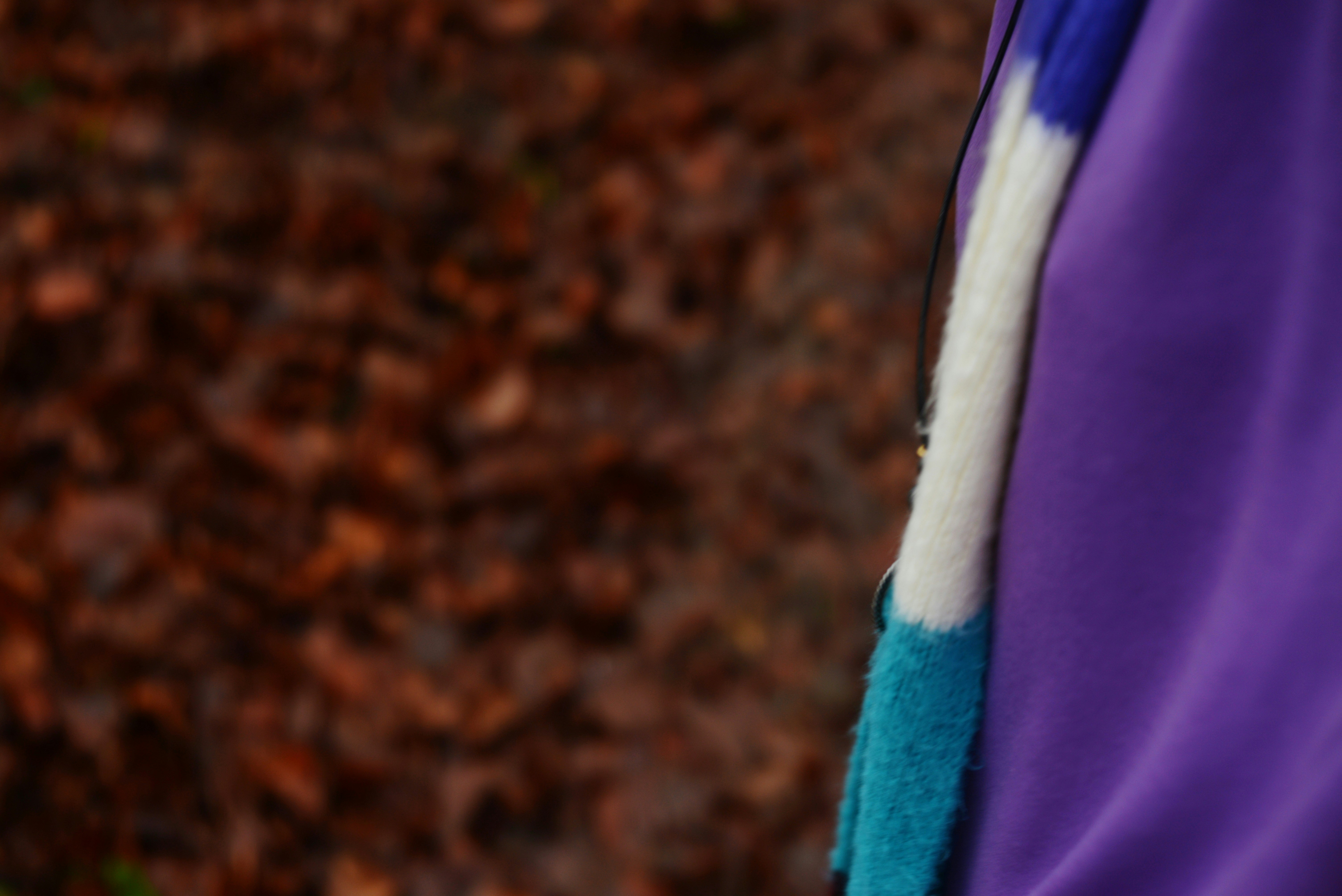 Colorful Fabric at the Edge: Bold Purple with Teal Accent