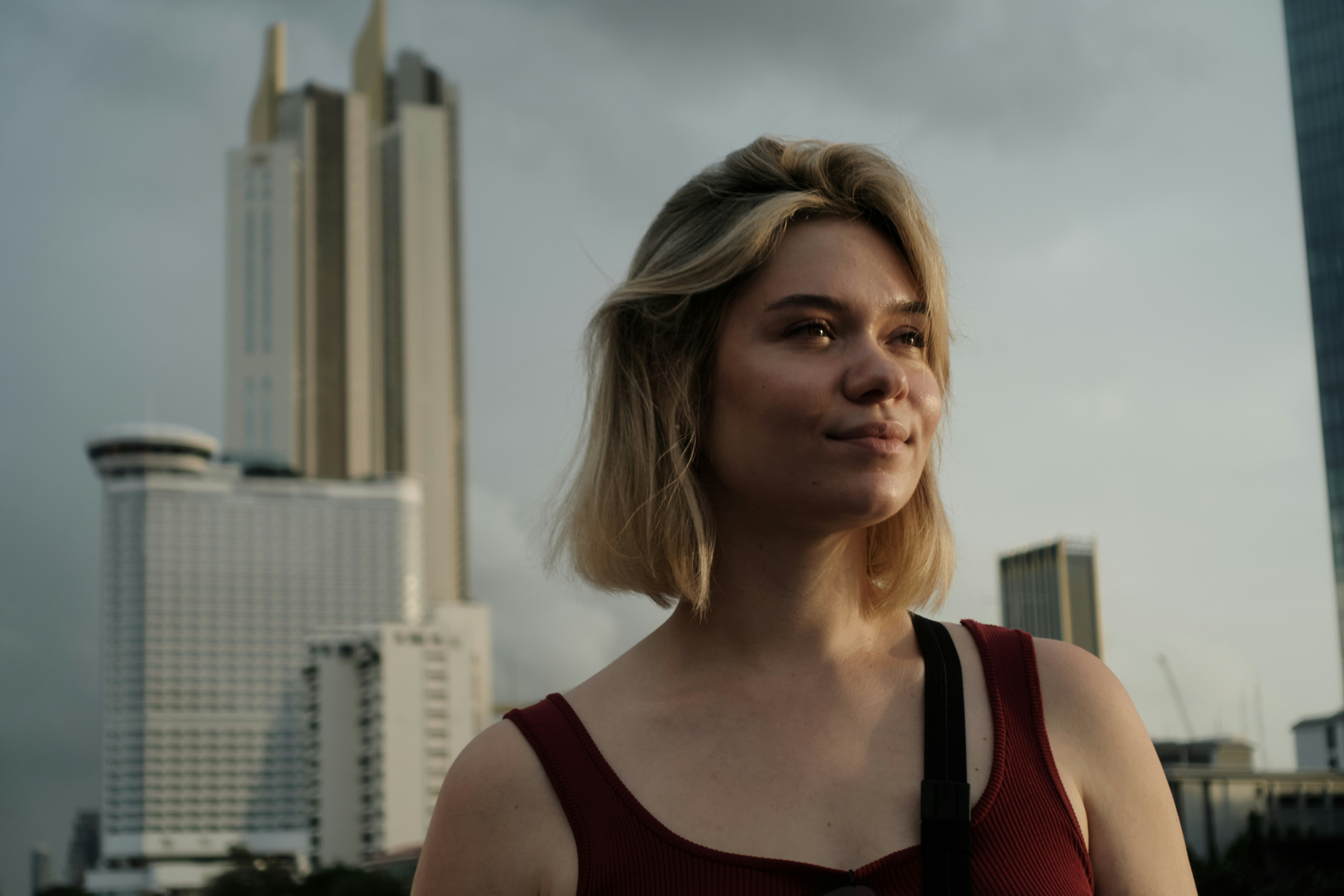 City Glow: A Portrait Beneath Skyscrapers