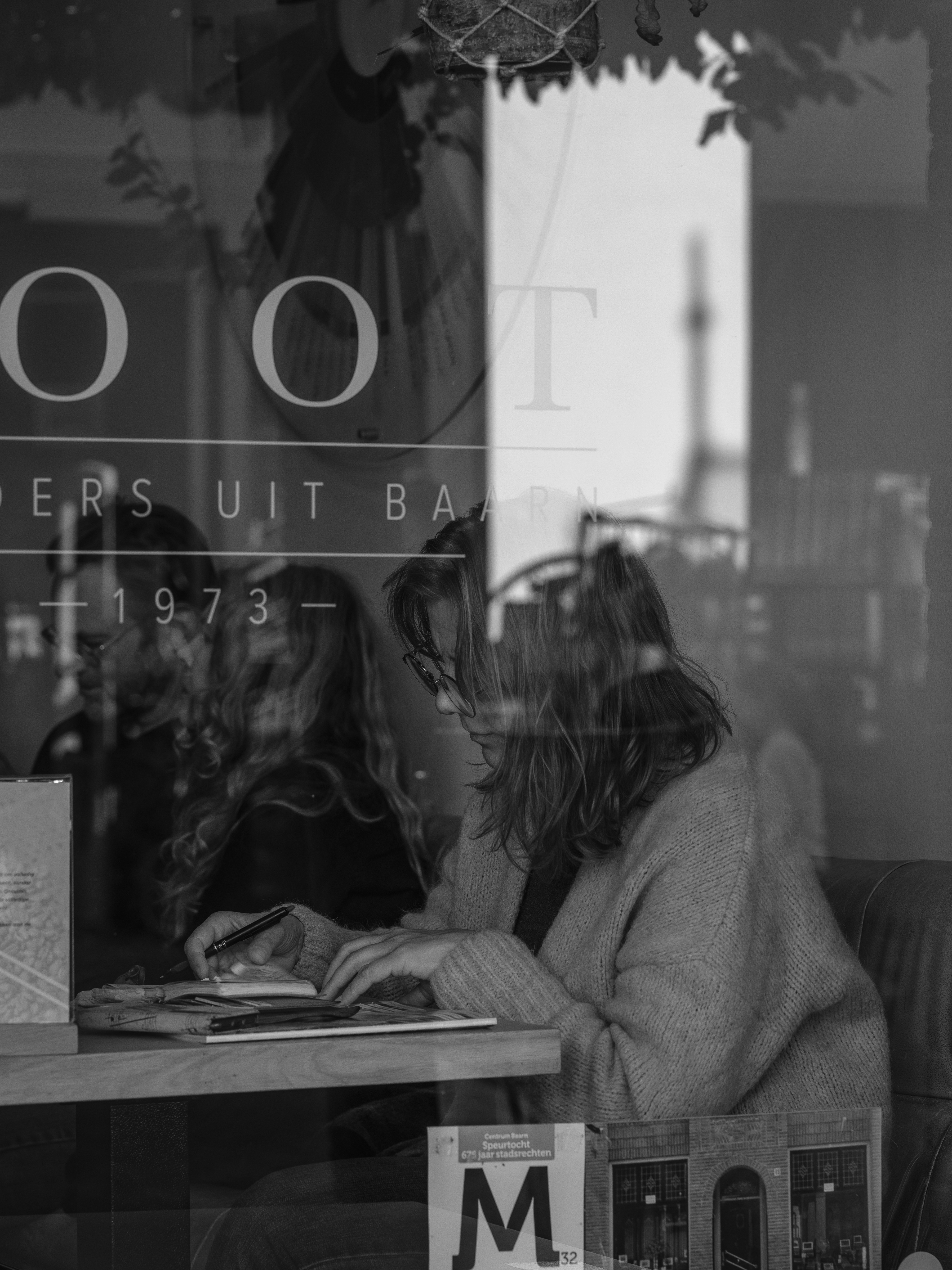 Soft Focus, Hard Lines: A Quiet Moment Behind the Glass