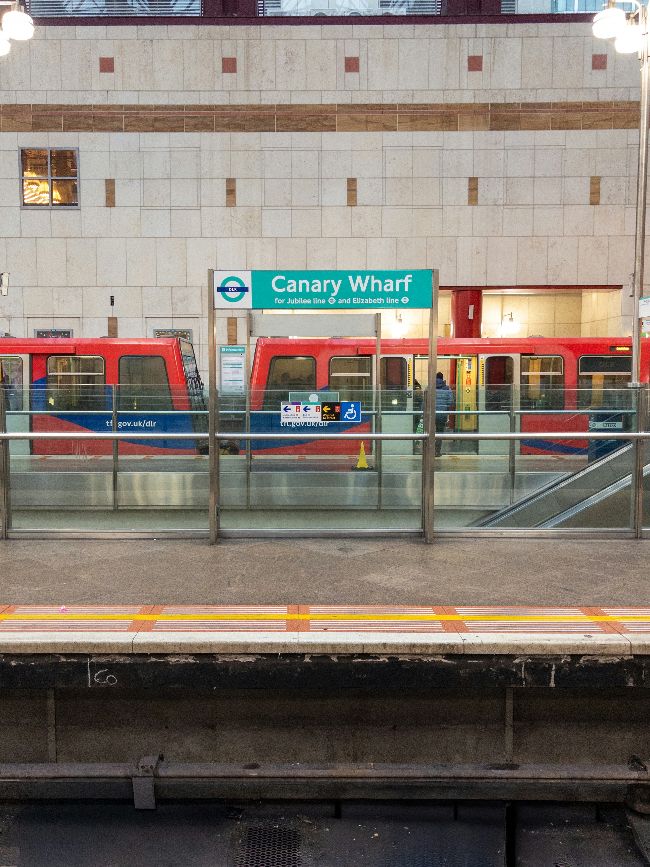 Canary wharf station with a red train