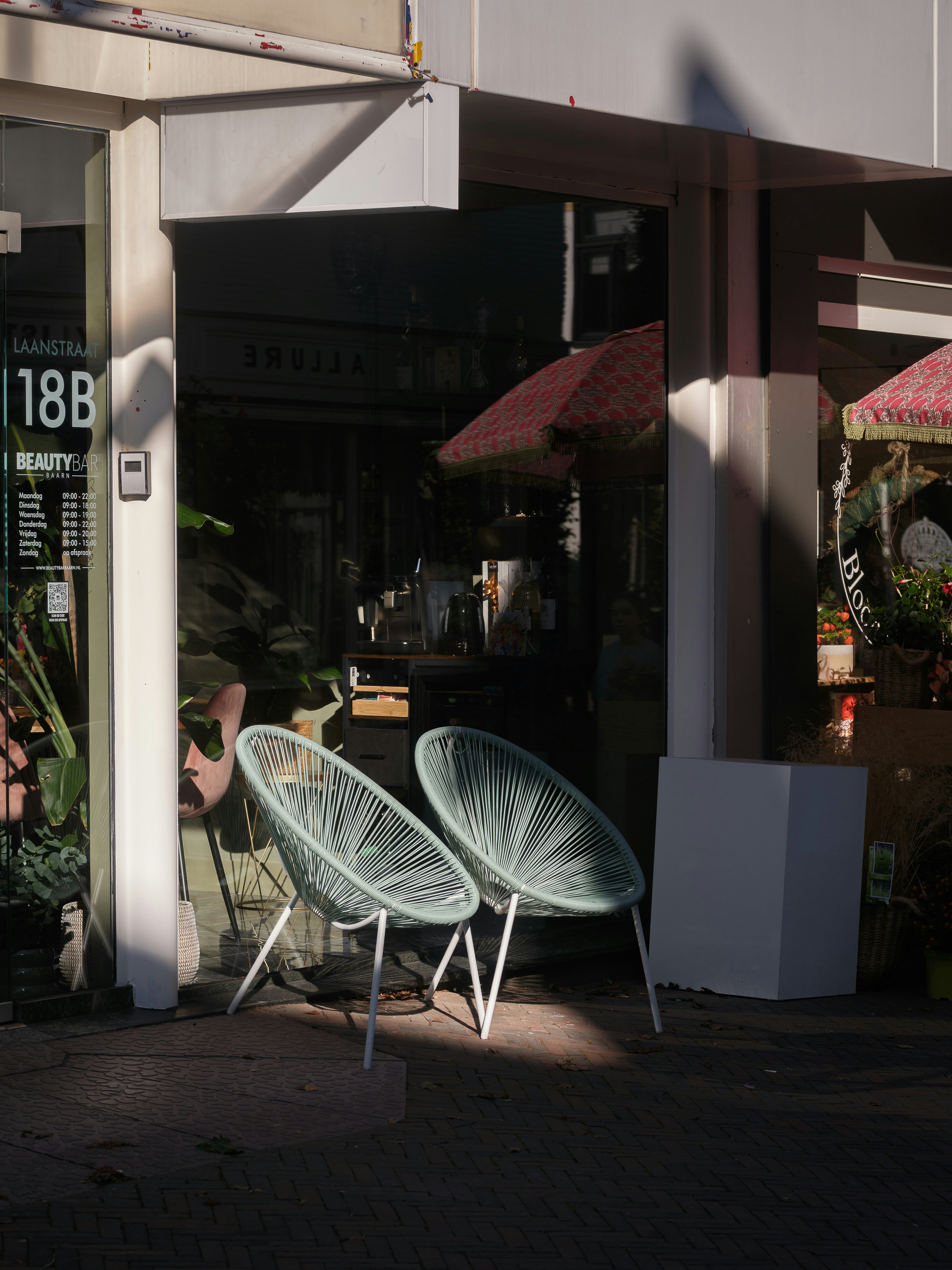 Whispers of Steel and Sunlight at a Quiet Café Front