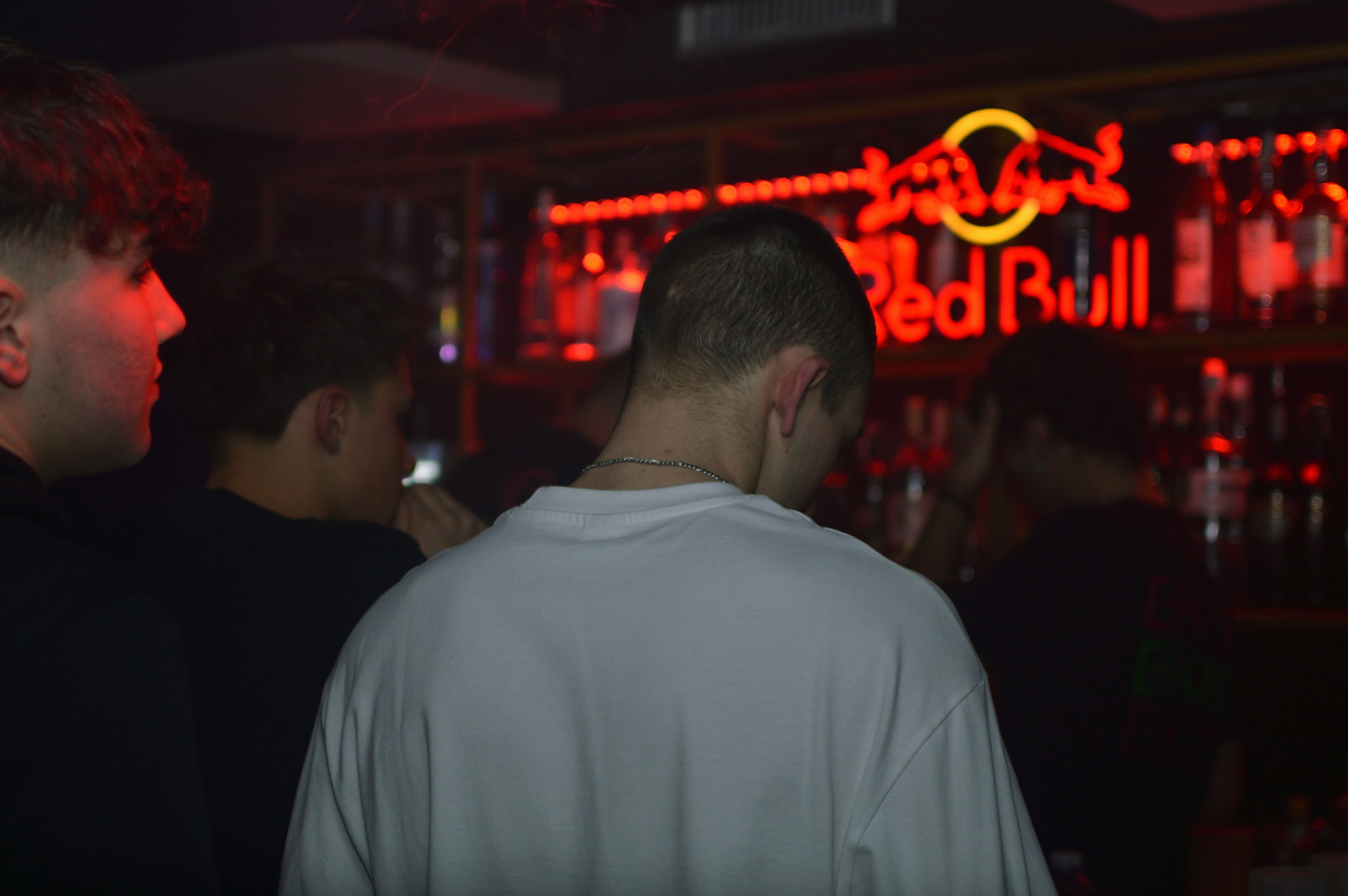 Back to the Bar: A Quiet Moment in Neon Night