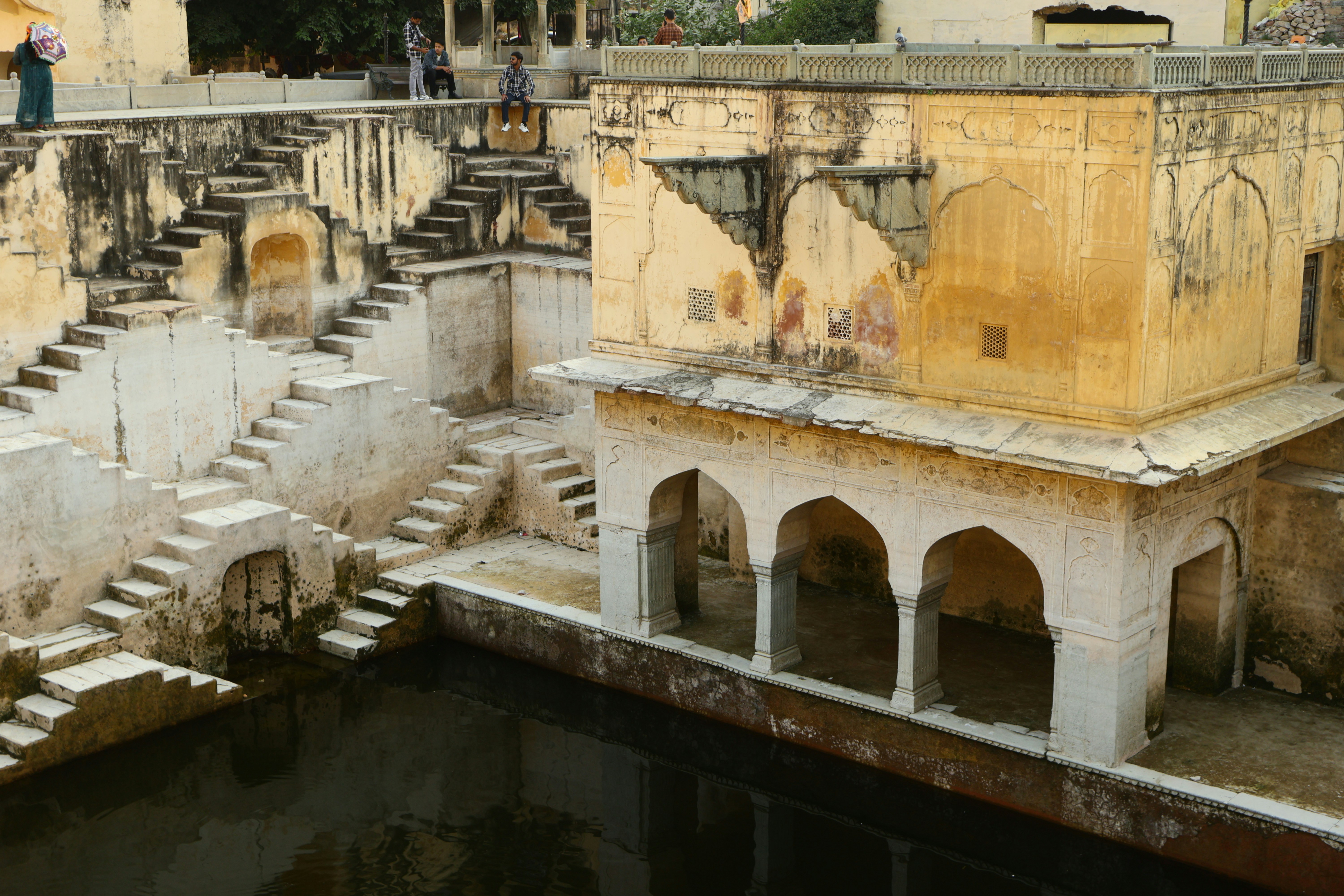 A view of symetrical stepwell called Panna Meena ka Kund situated in Amer, Jaipur near Amer palace. The stepwell is a popular filming location and has beautiful symertical steps that go all the way down.
