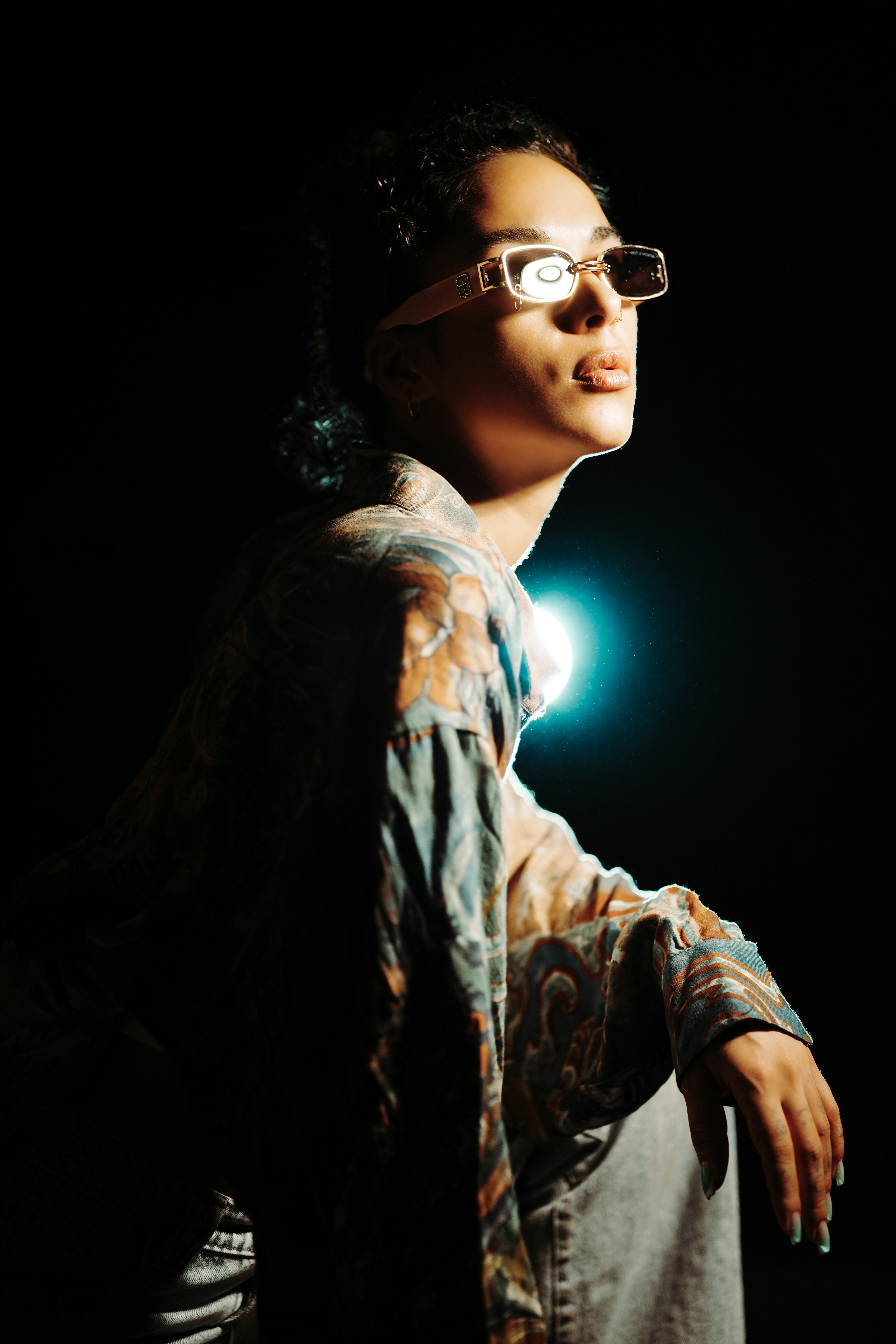 Haloed Gaze: A Portrait in Backlit Night