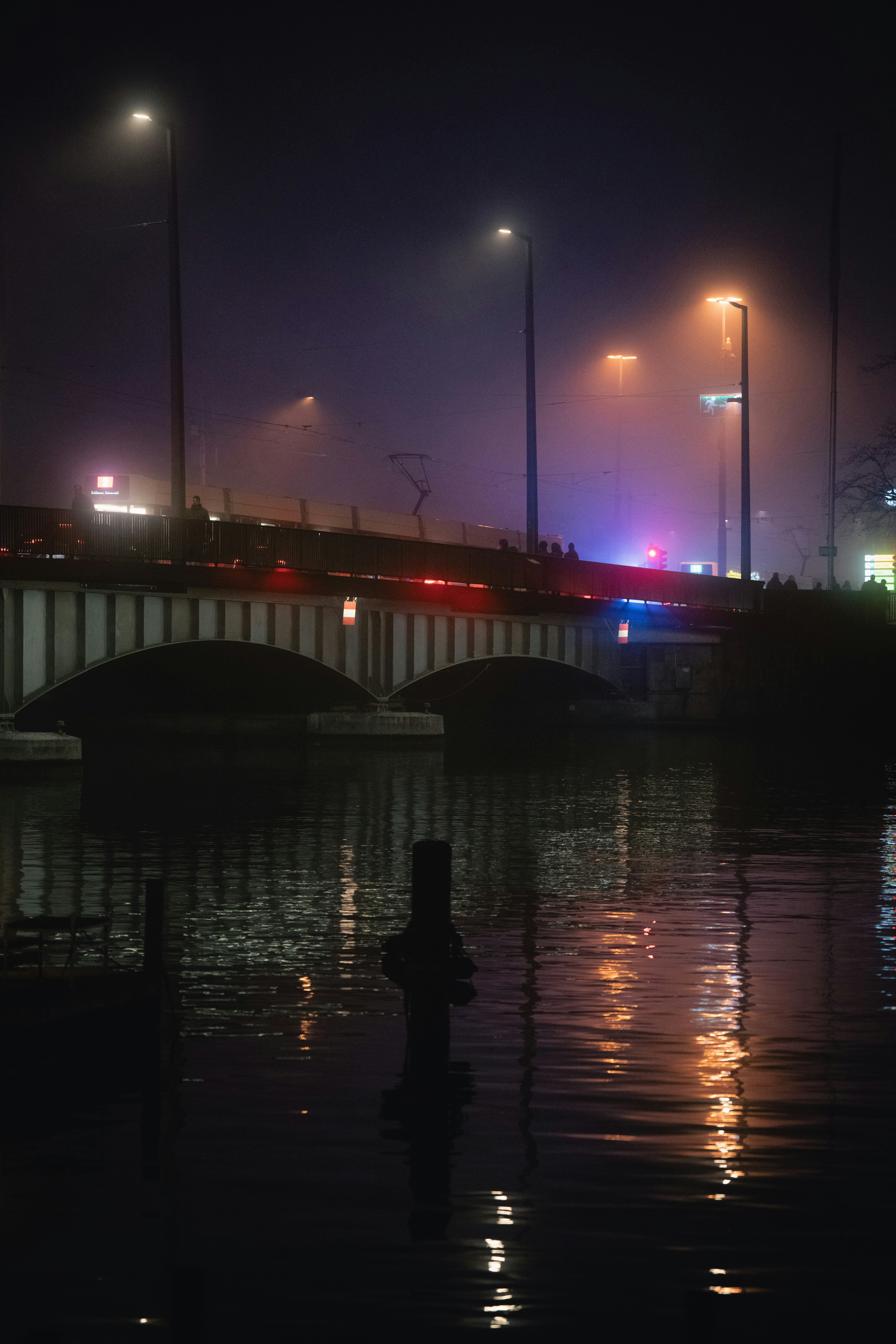 Nighttime Bridge on Neon Mist