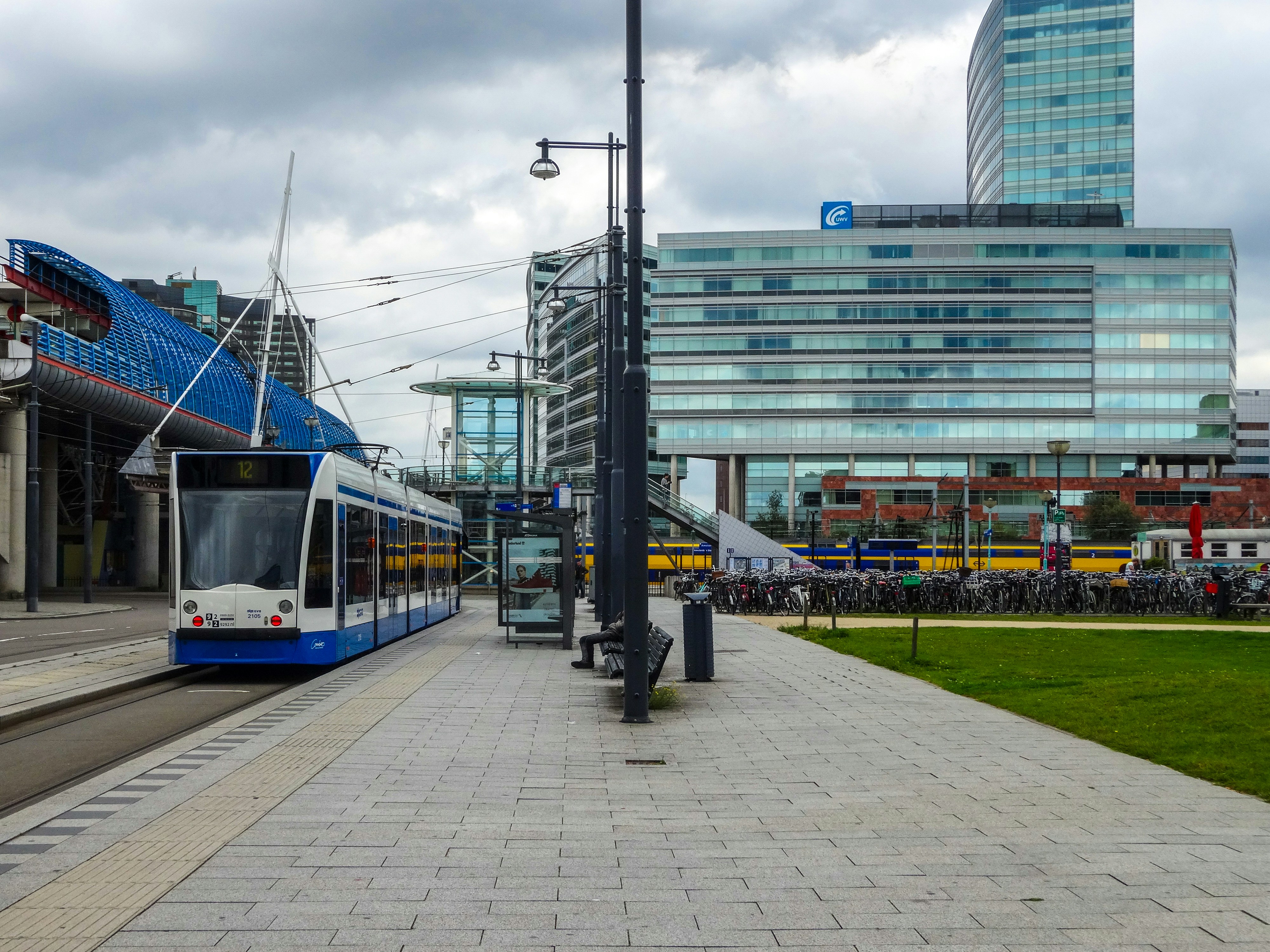 Urban Tram at the Edge of the Modern Plaza