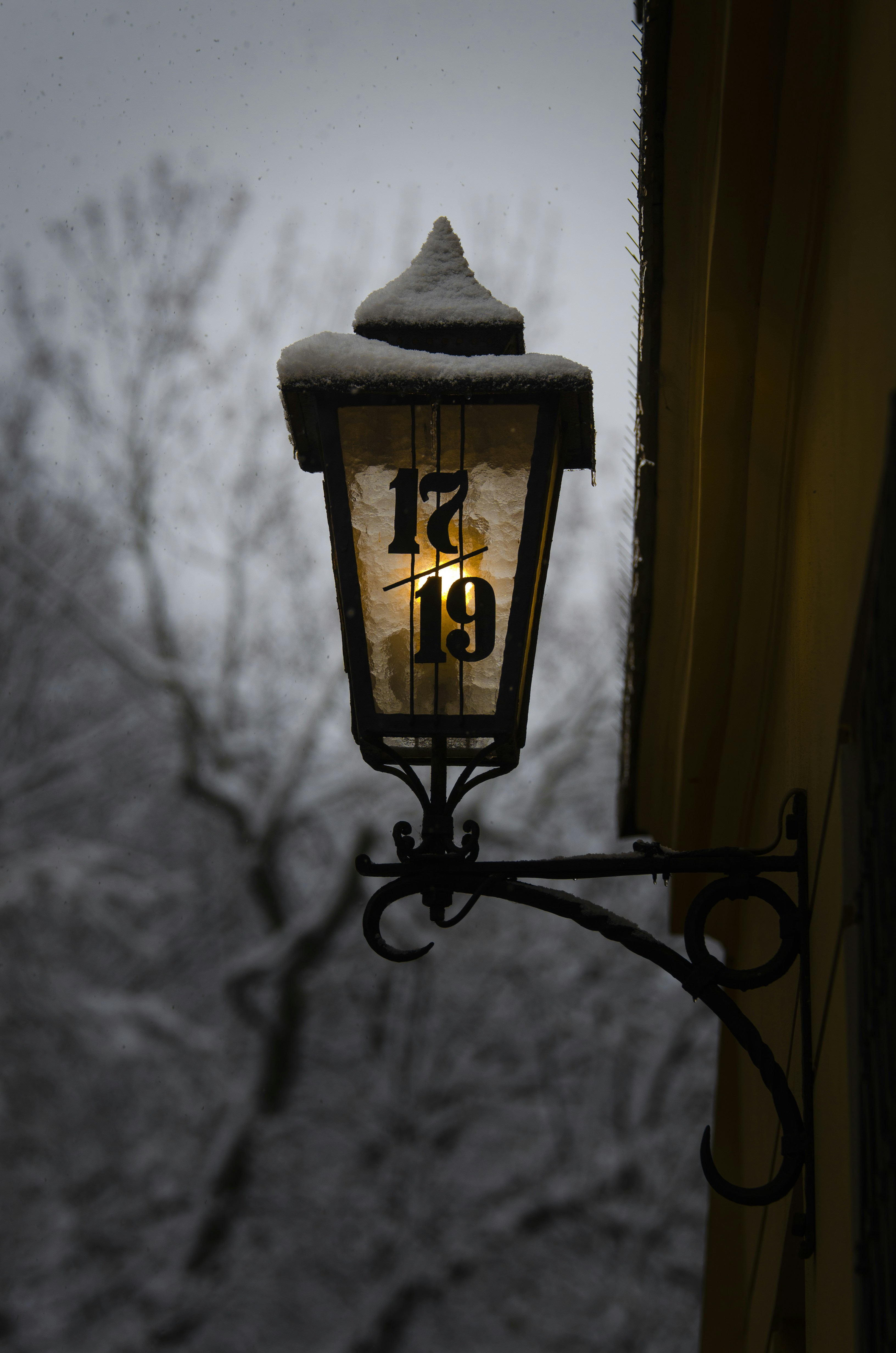 A vintage lantern with numbers 17 and 19 in snow. photo – Free Lantern ...