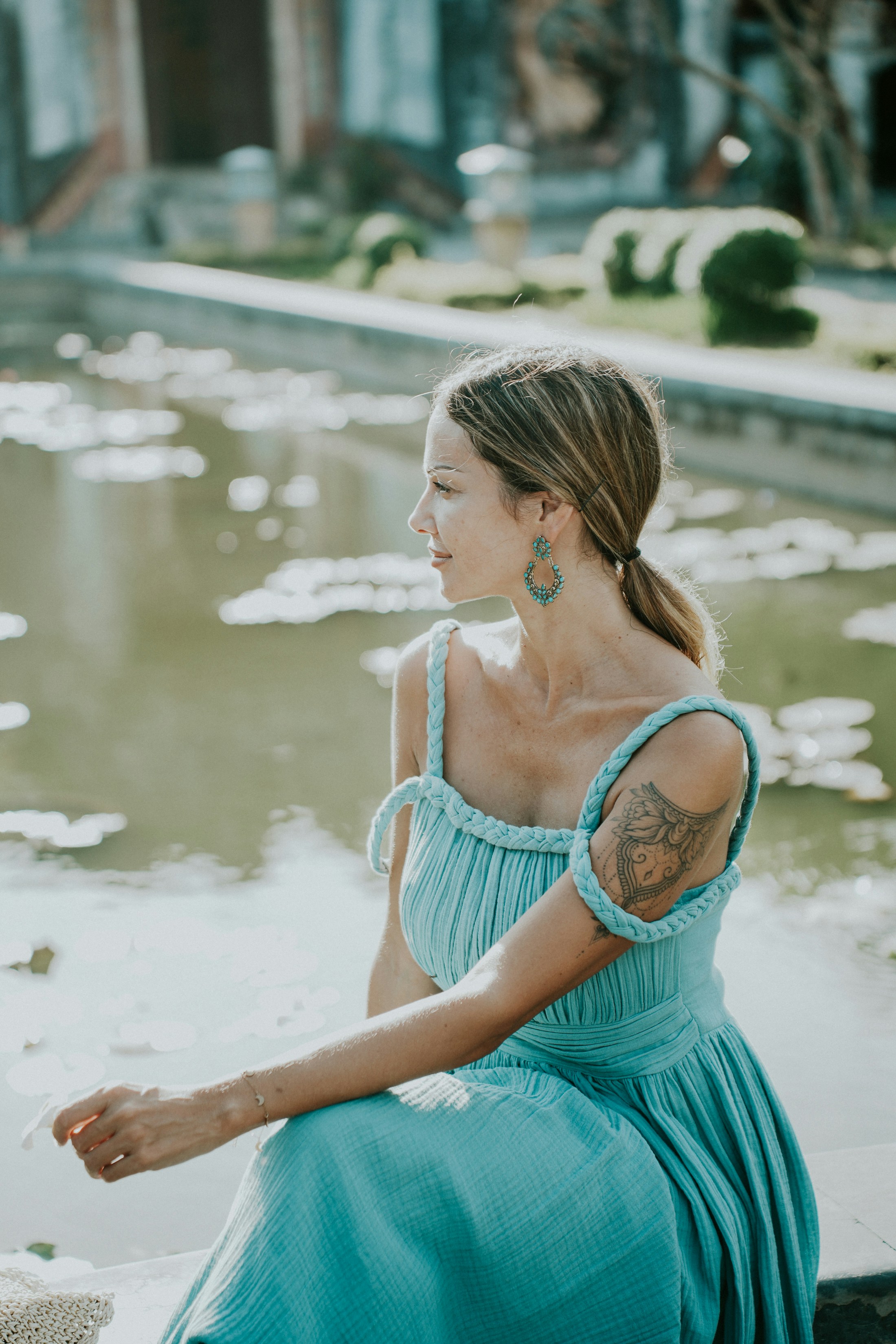 A Quiet Moment by the Water: Turquoise Dress in Soft Light