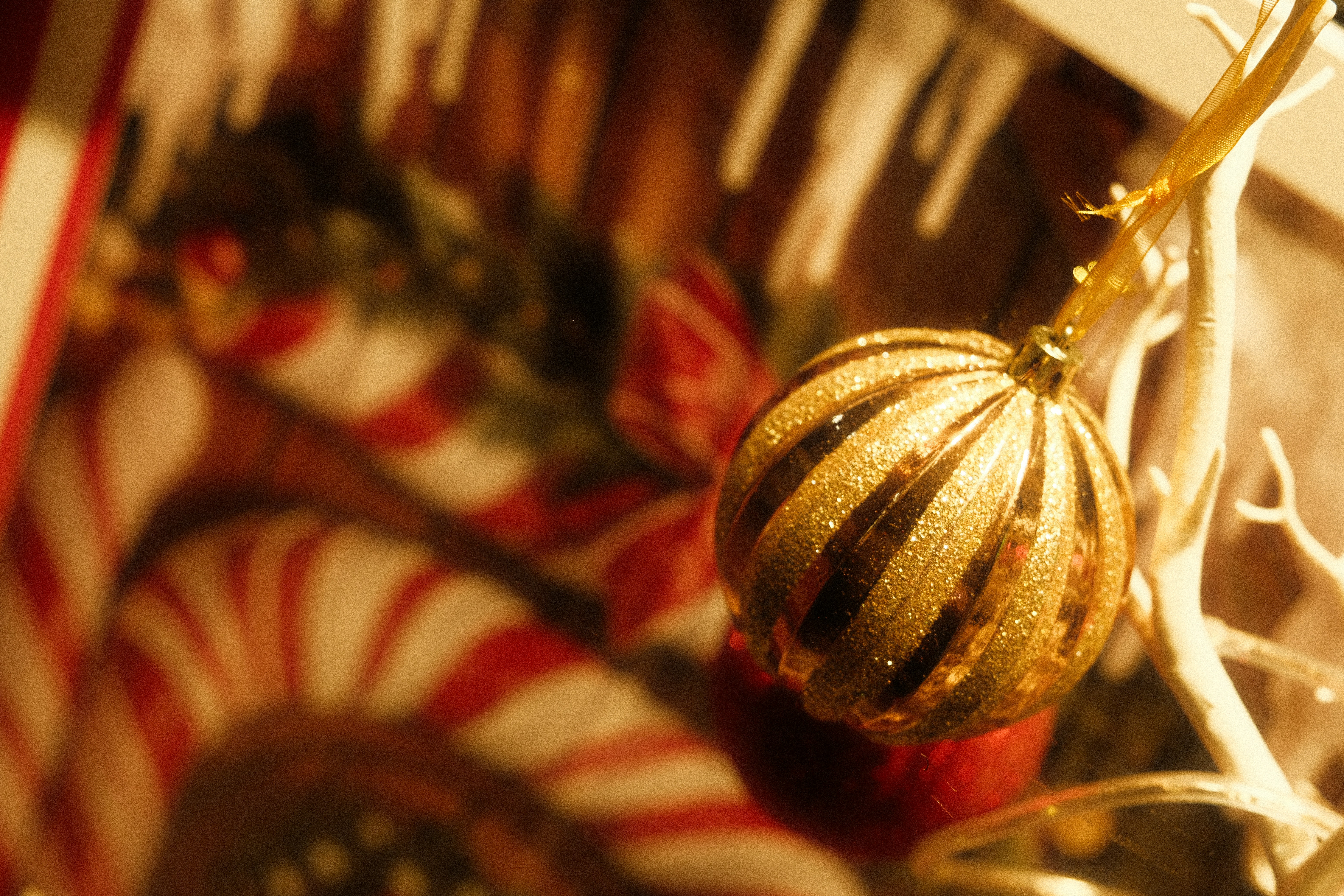 Gilded Ornament in Warm Glass: A Christmas Macro Moment