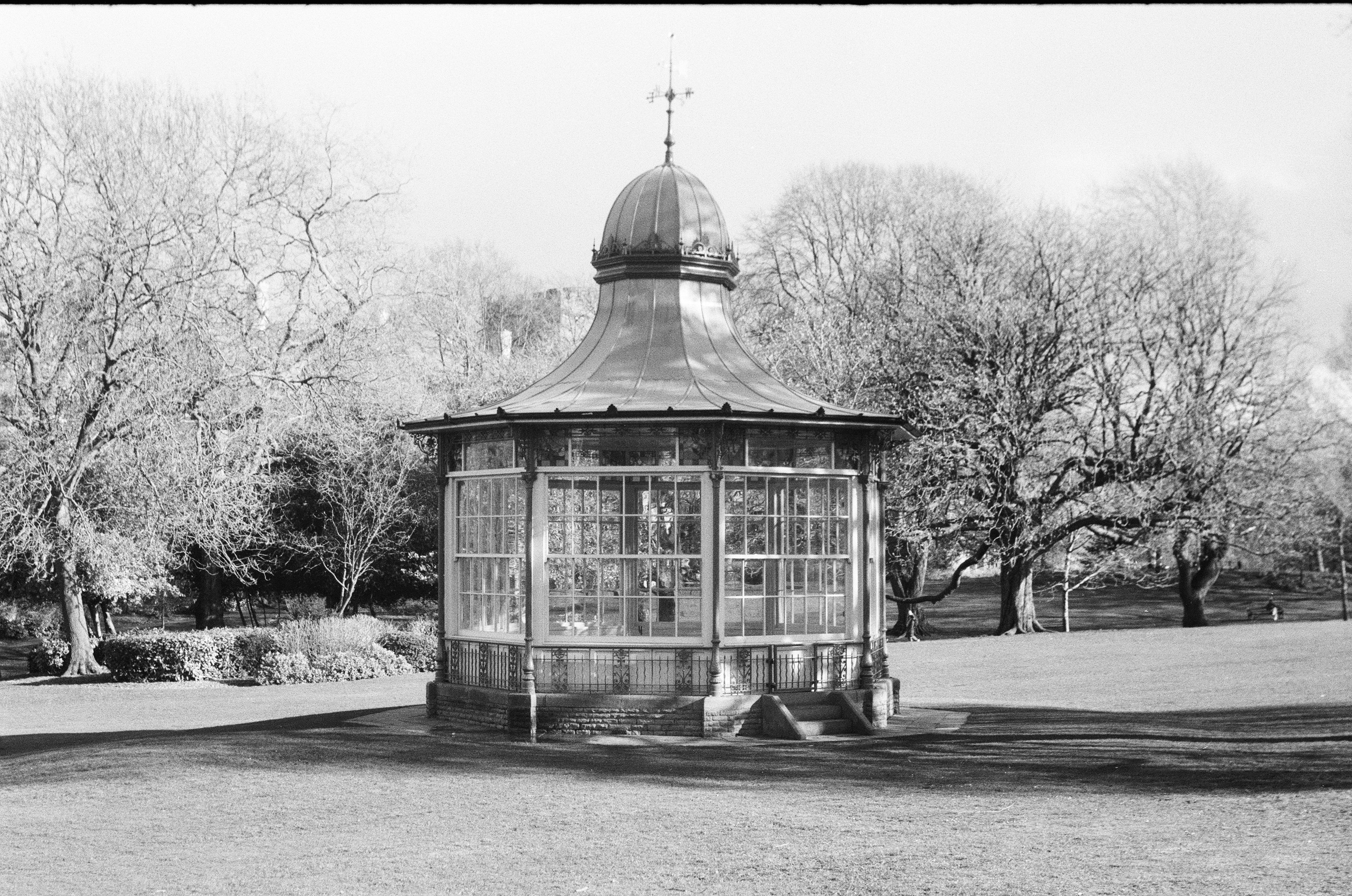 Gazebo in a park with bare trees