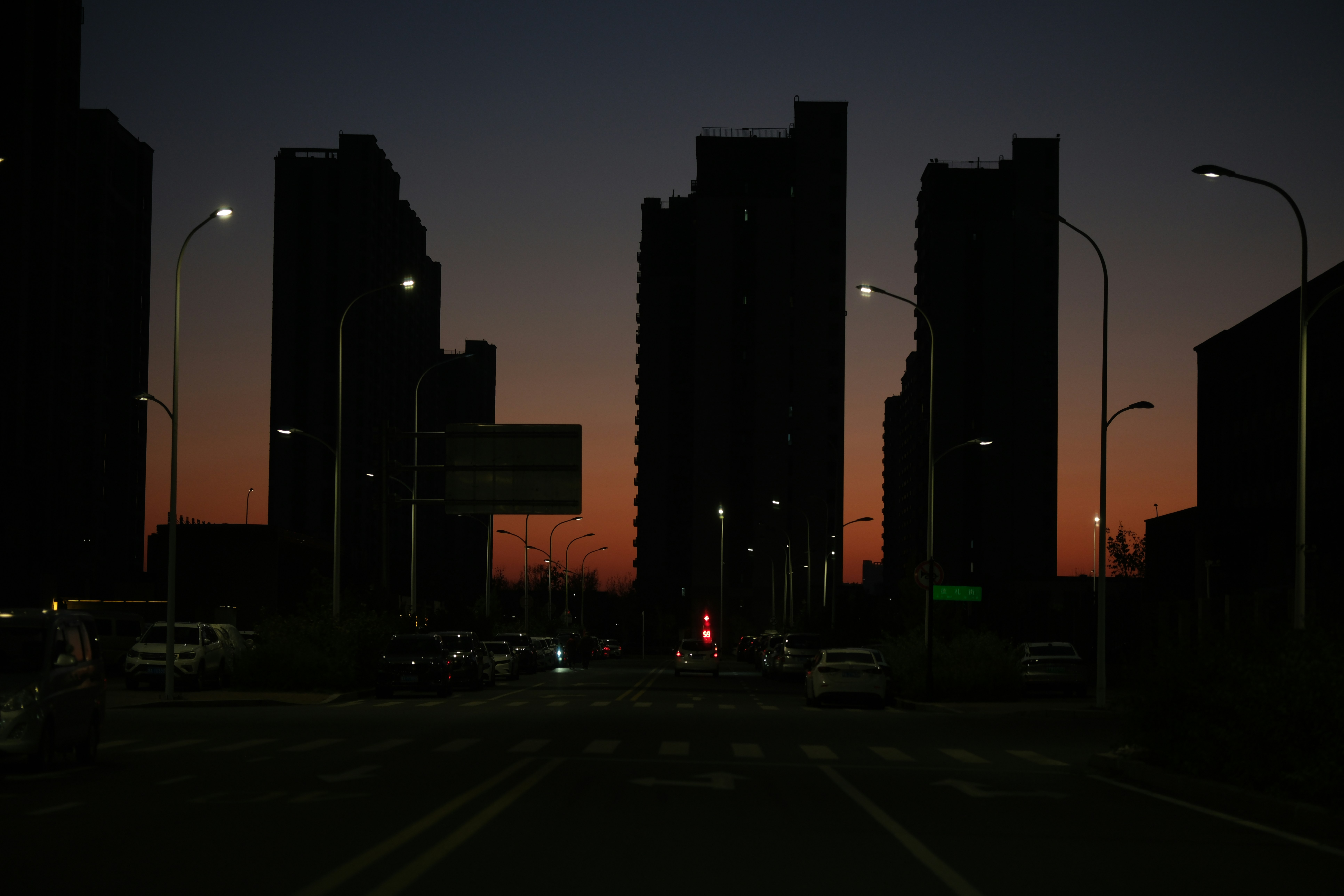 Midnight Corridor: Silhouettes Under Streetlights