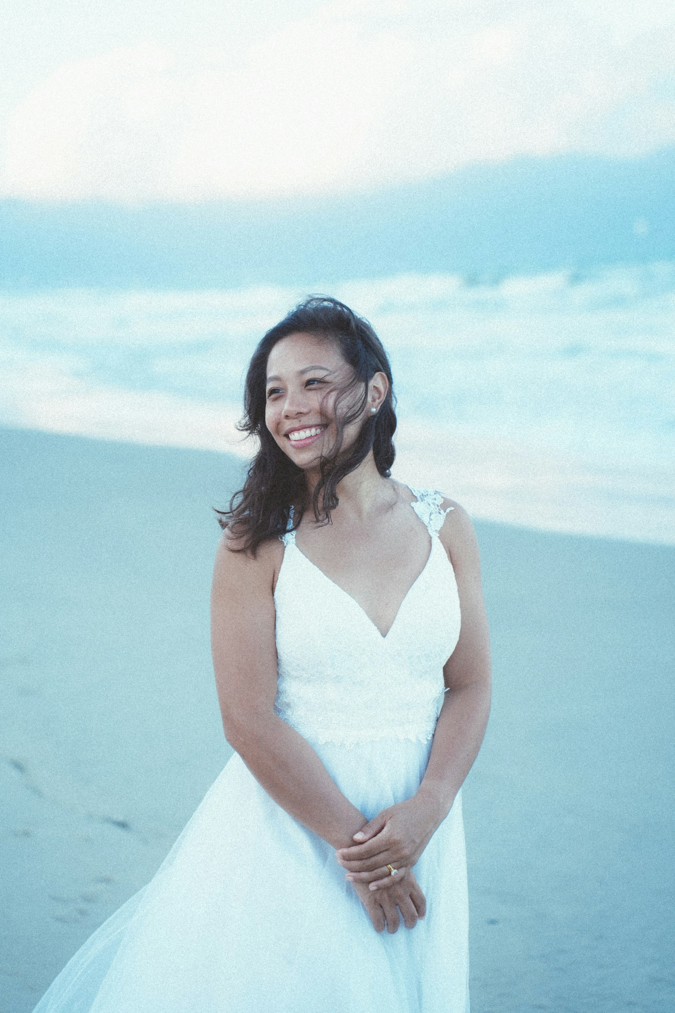 Grace on the Shore: a bridal portrait against the sea breeze
