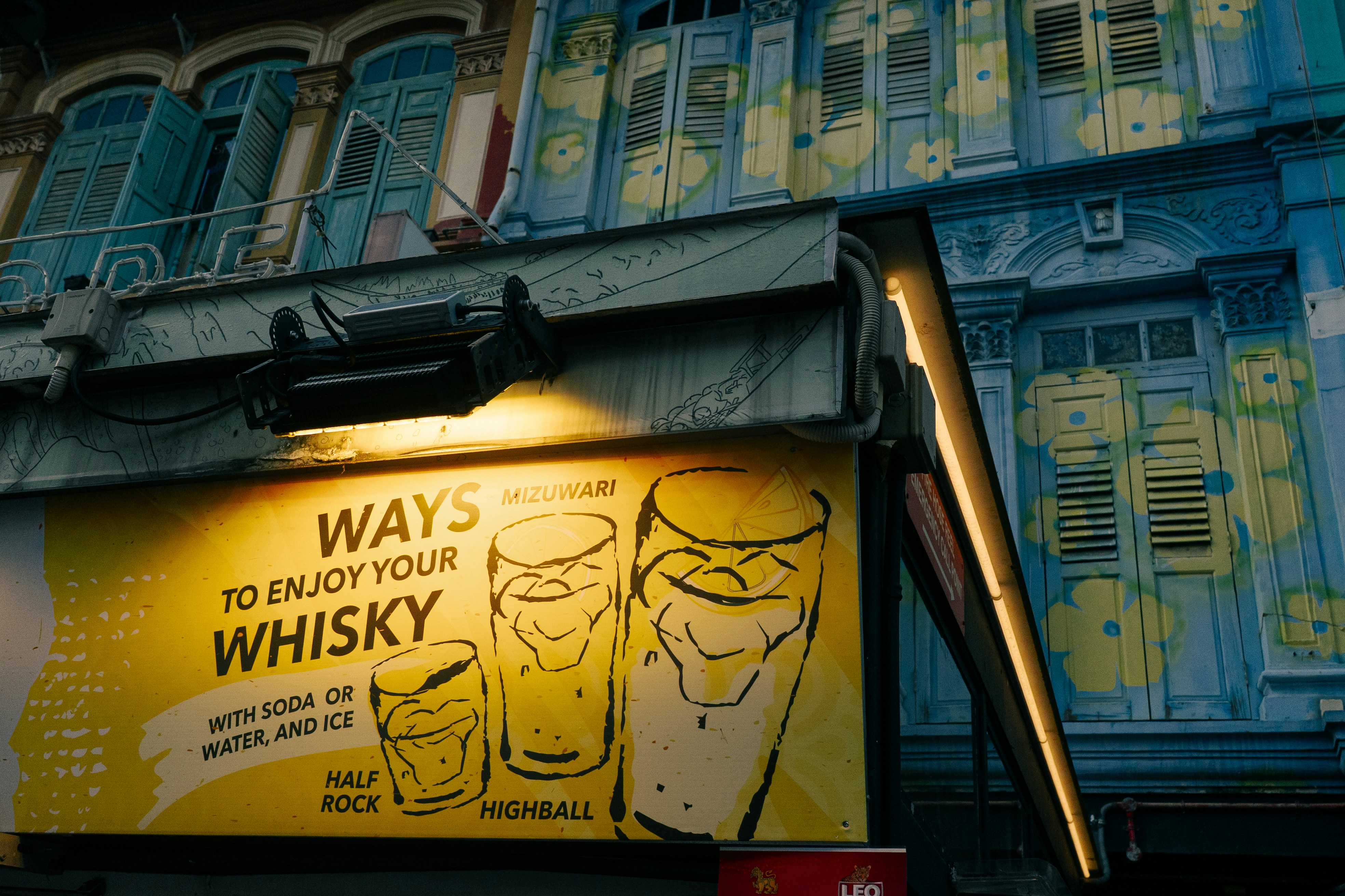 Waves of Neon Light Over a Classic Streetfront