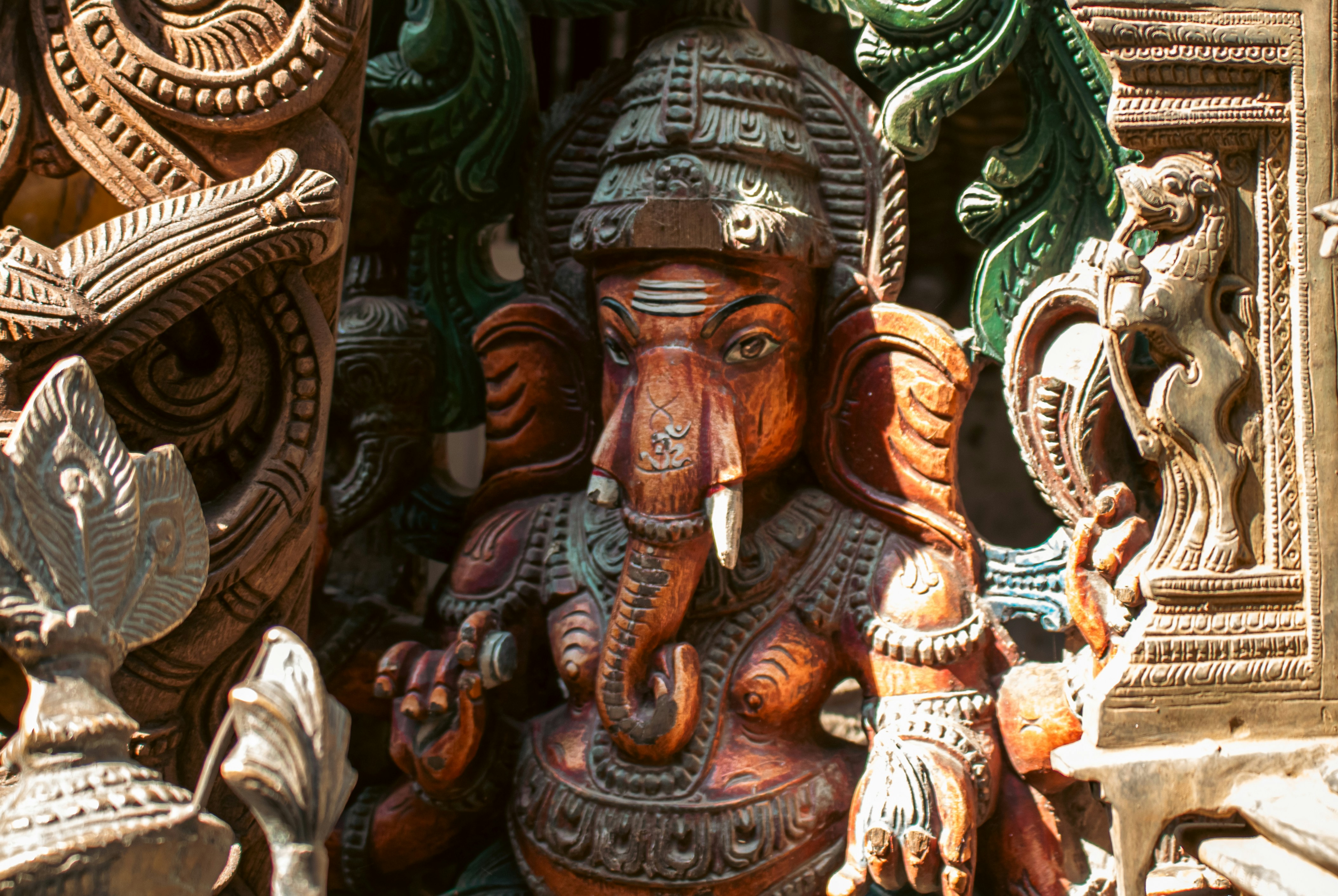 Wooden sculpture of Lord Ganesha at Chor Bazaar, one of the largest flea markets in India, located on Mutton Street, near Bhendi Bazaar in Grant Road, South Mumbai.