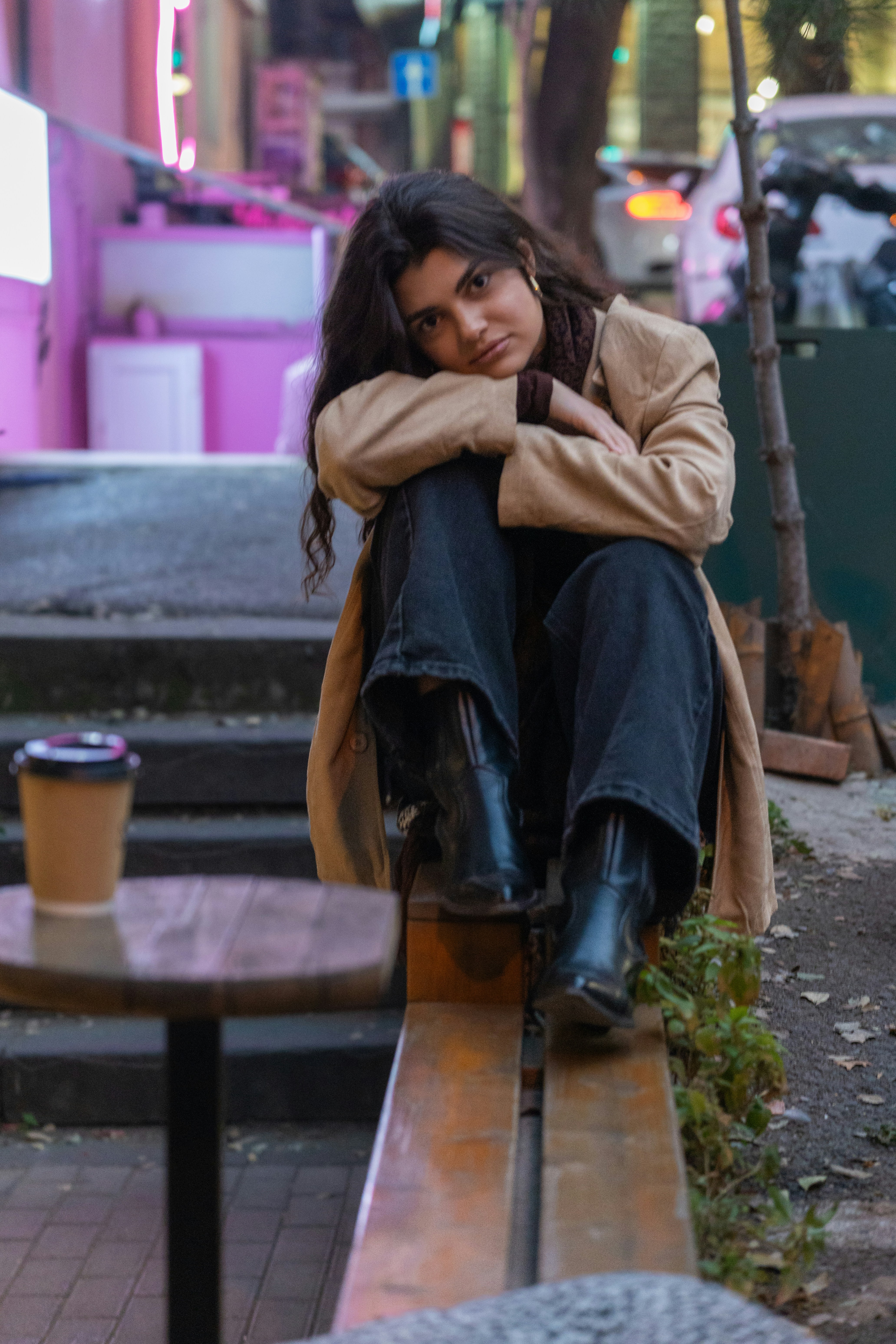 Tired Youth in Neon Alleyway