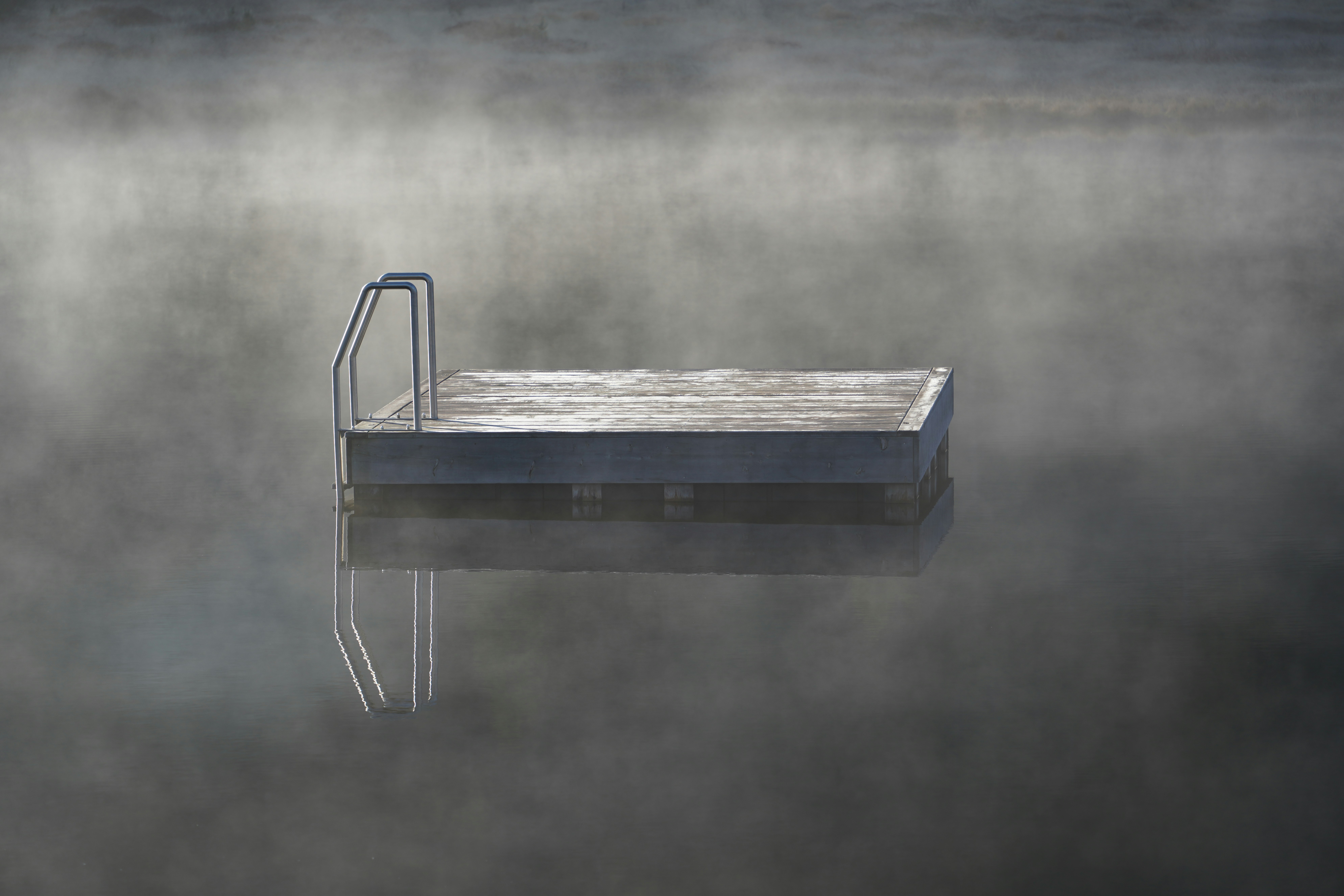 Floating Dock in Quiet Mist