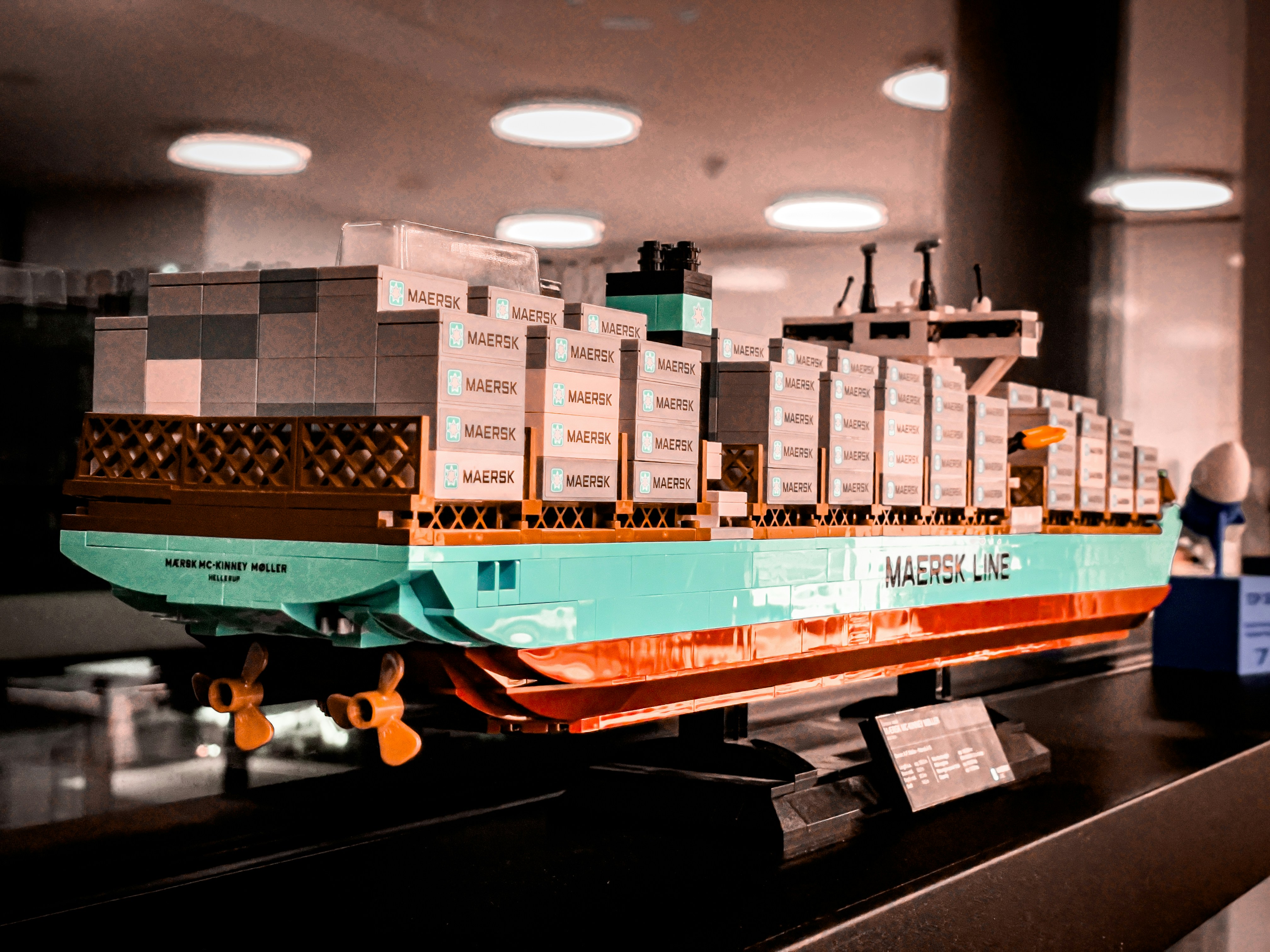 Maersk Line Model Ship: A Curious Cargo Display in Soft Neon