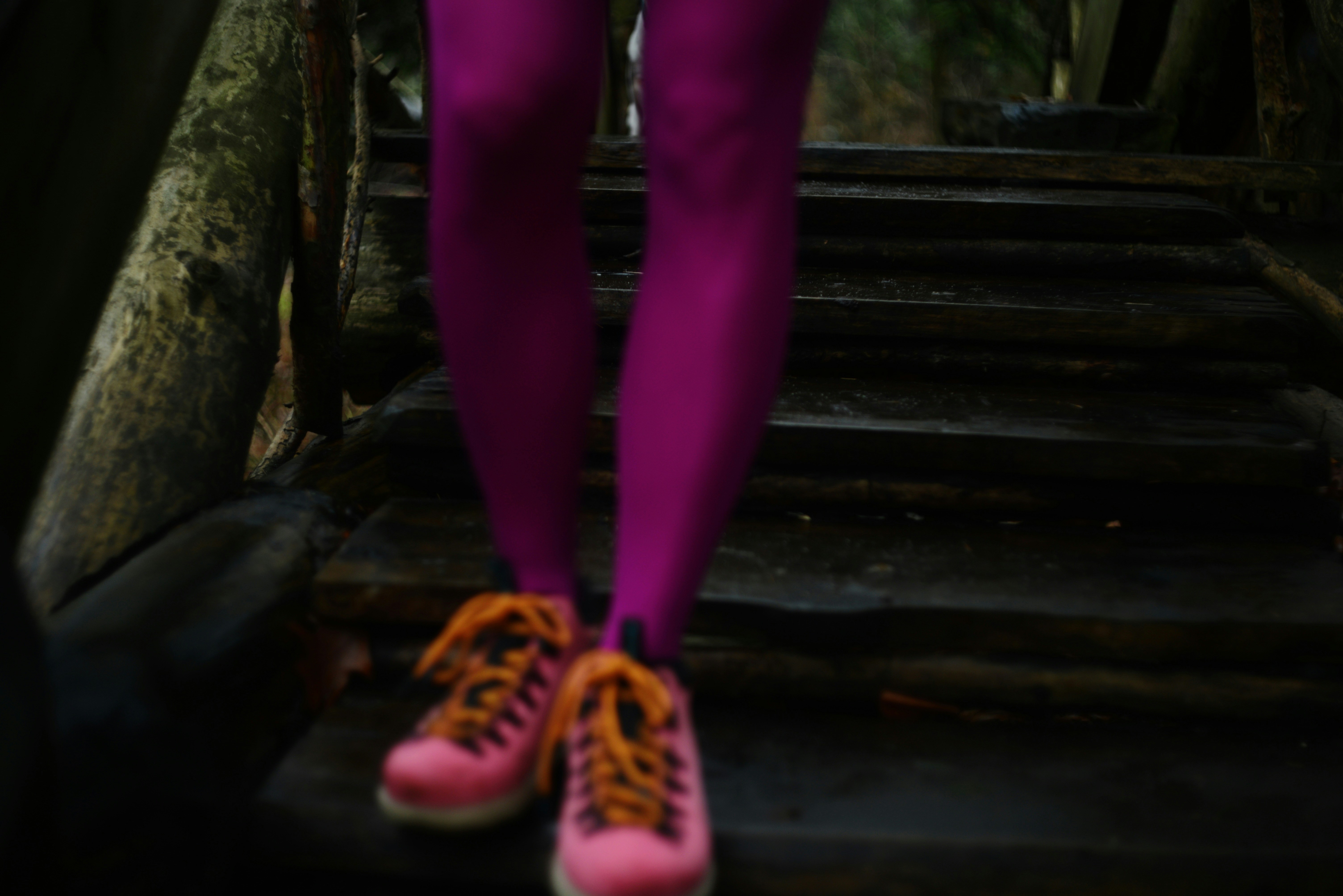 Bright Sneaker Step Down the Rain-Slick Staircase