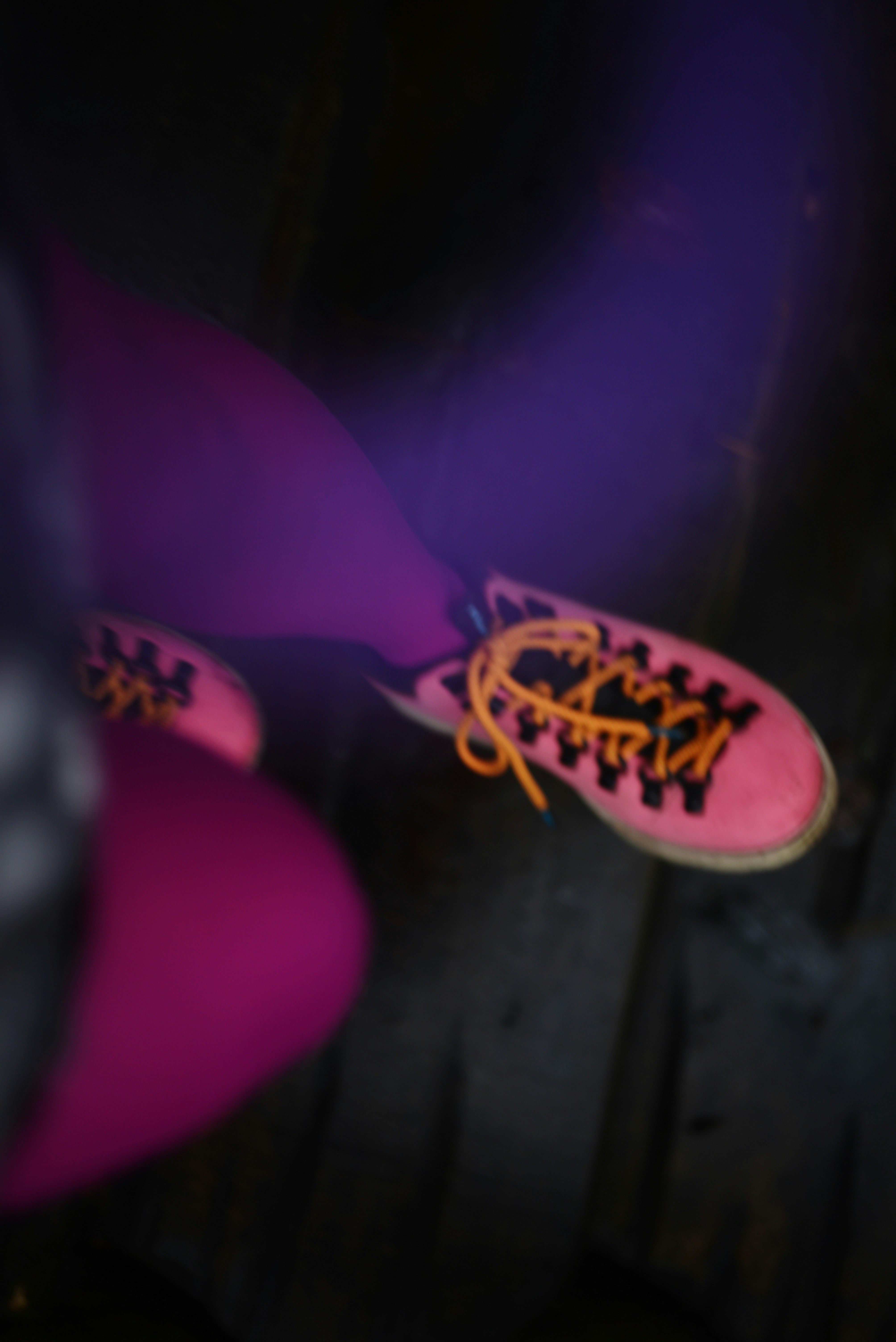 Neon Pink Shoes in a Shadowed Frame