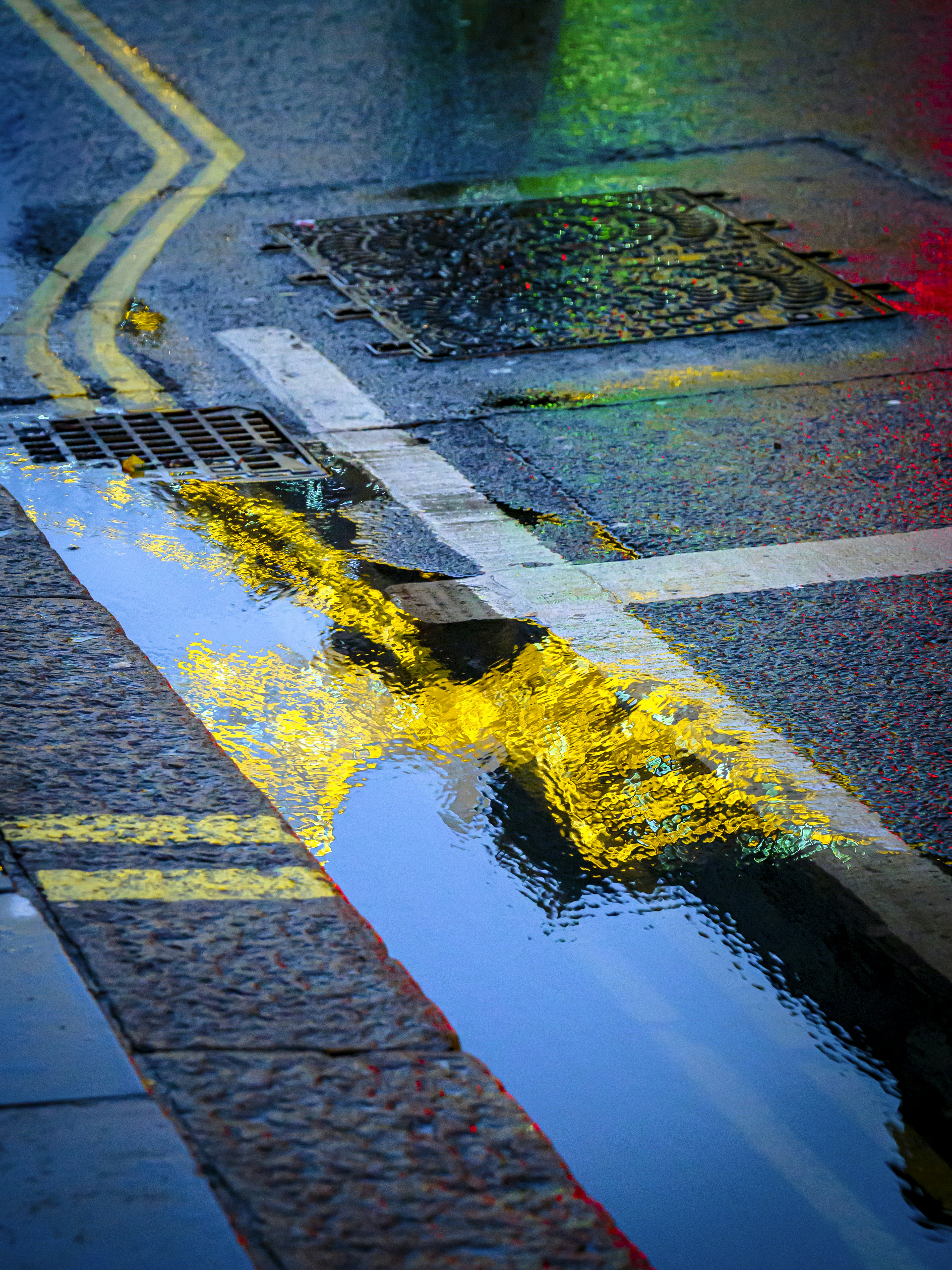 Reflections on Wet Asphalt: Neon Veil Across the Street