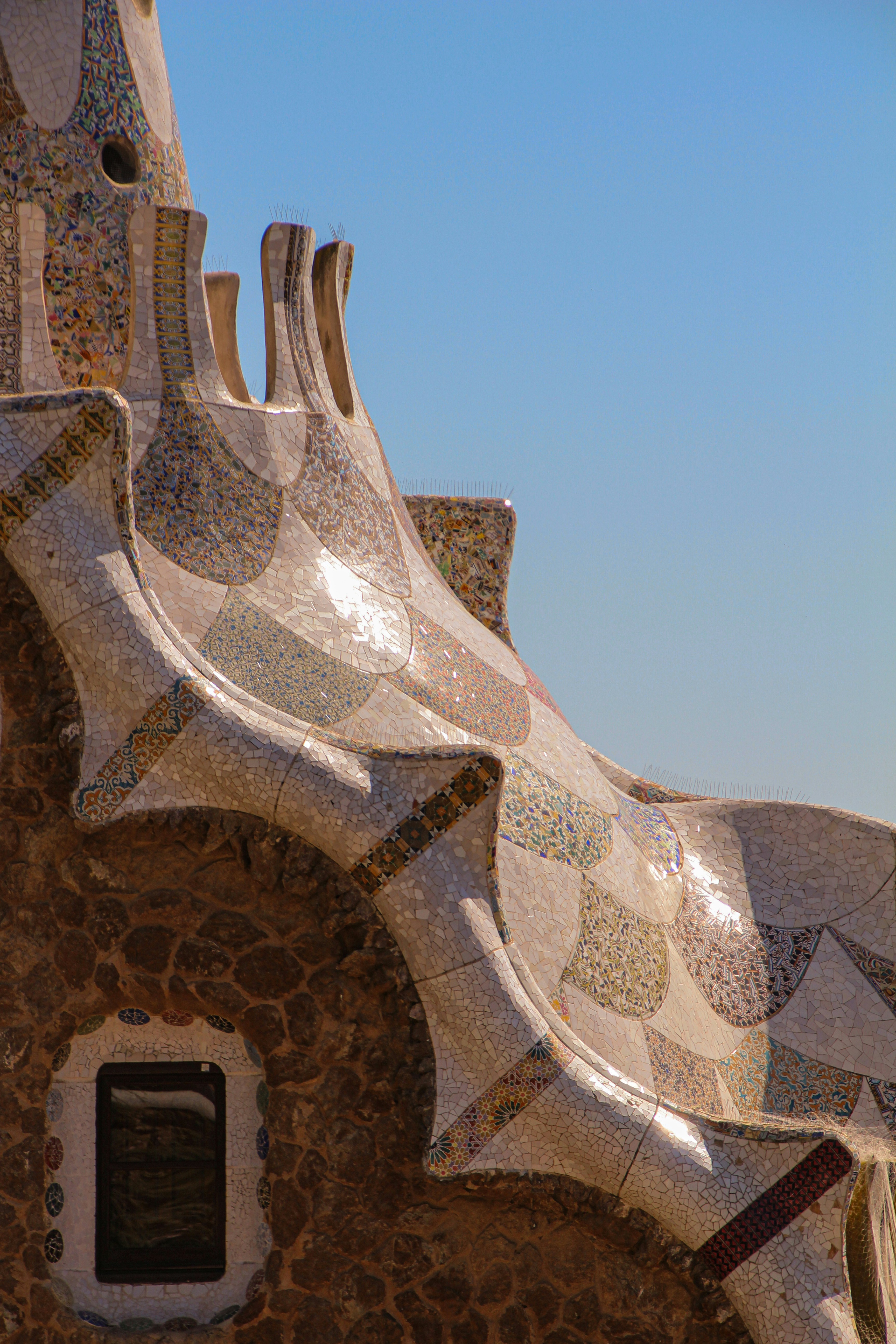Curved Mosaic Roof of a Gaudí-Influenced Structure