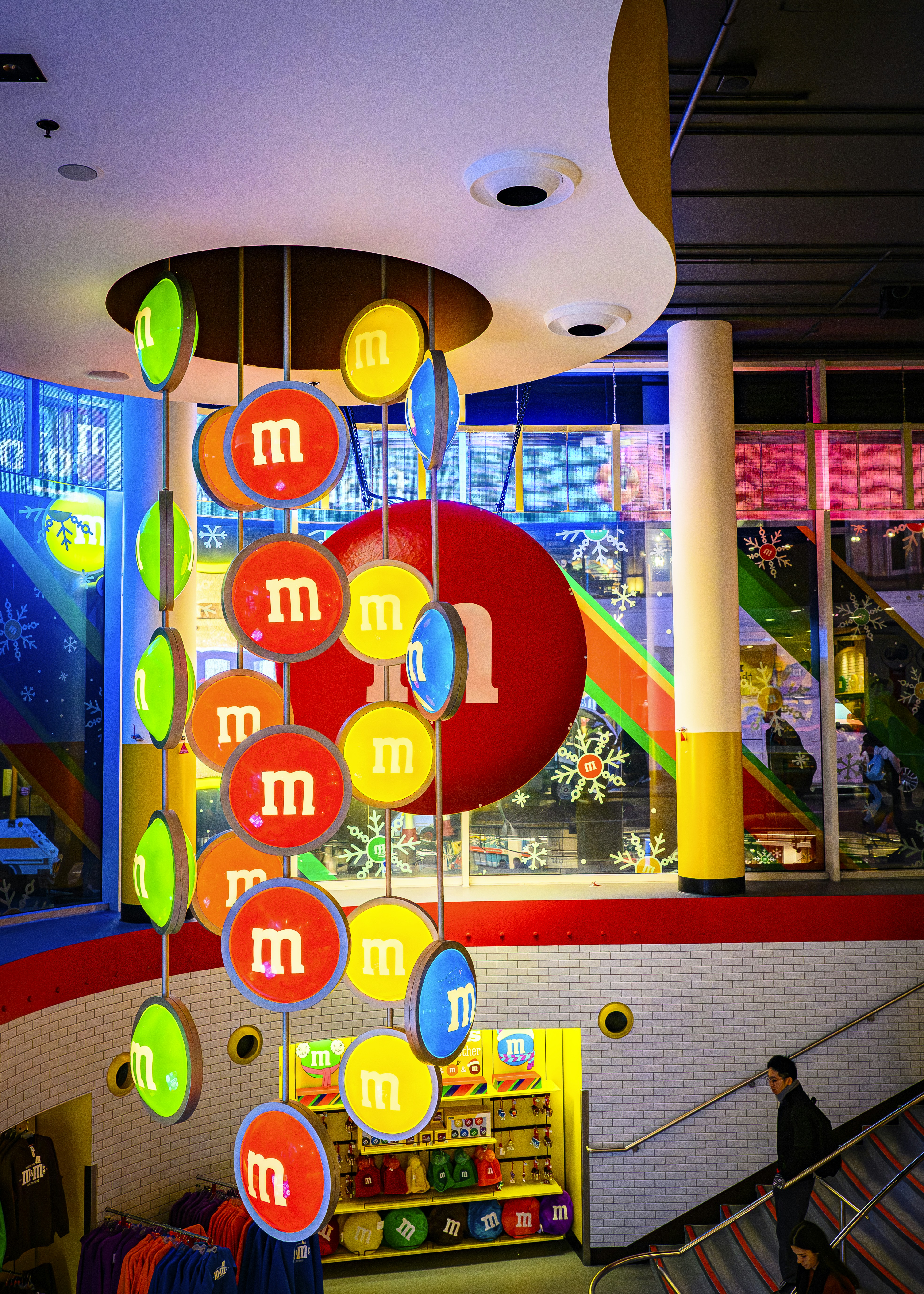 Colorful M&M Carousel in a Bright Indoor Atrium