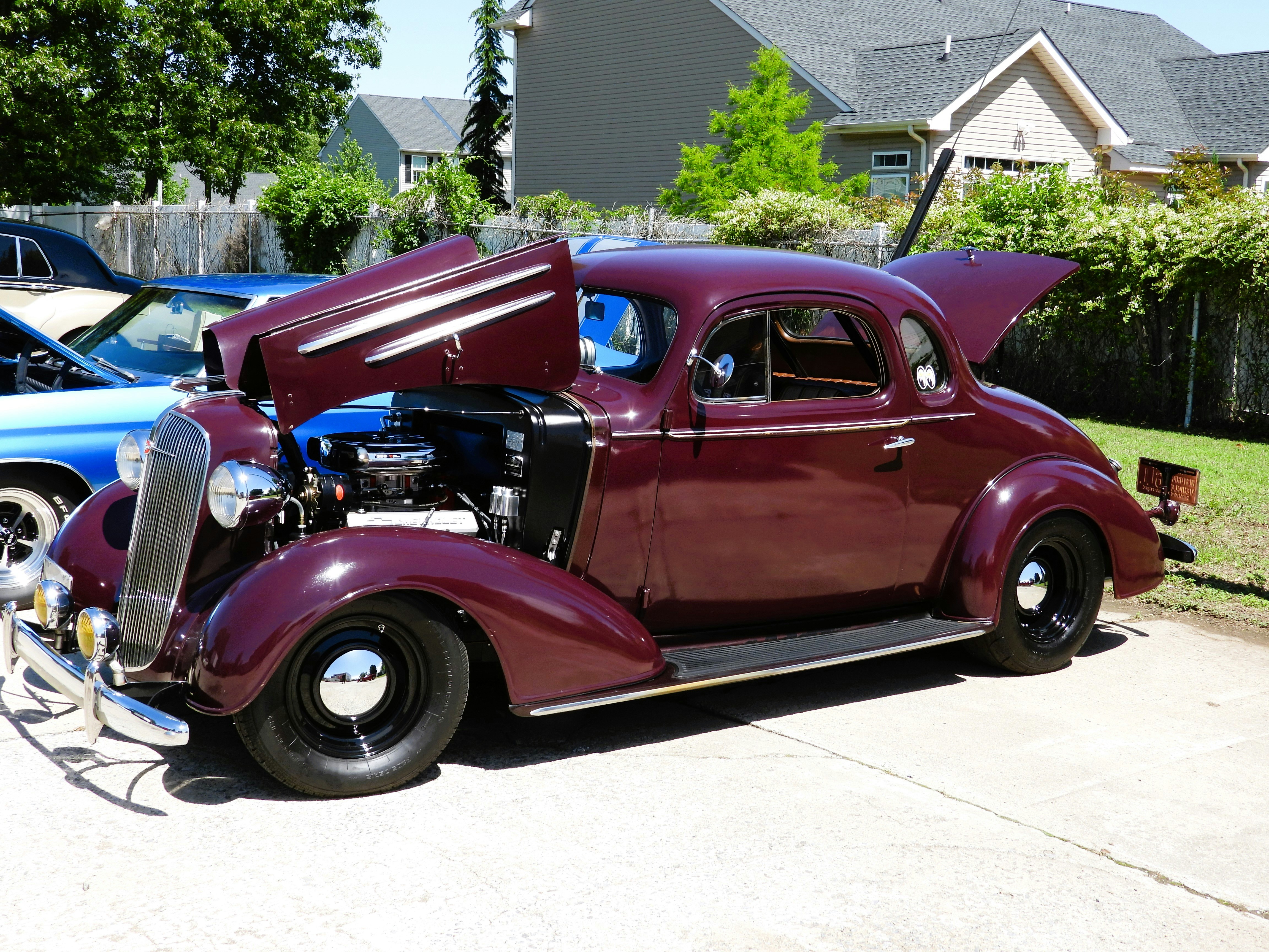 A vintage car at a car show.