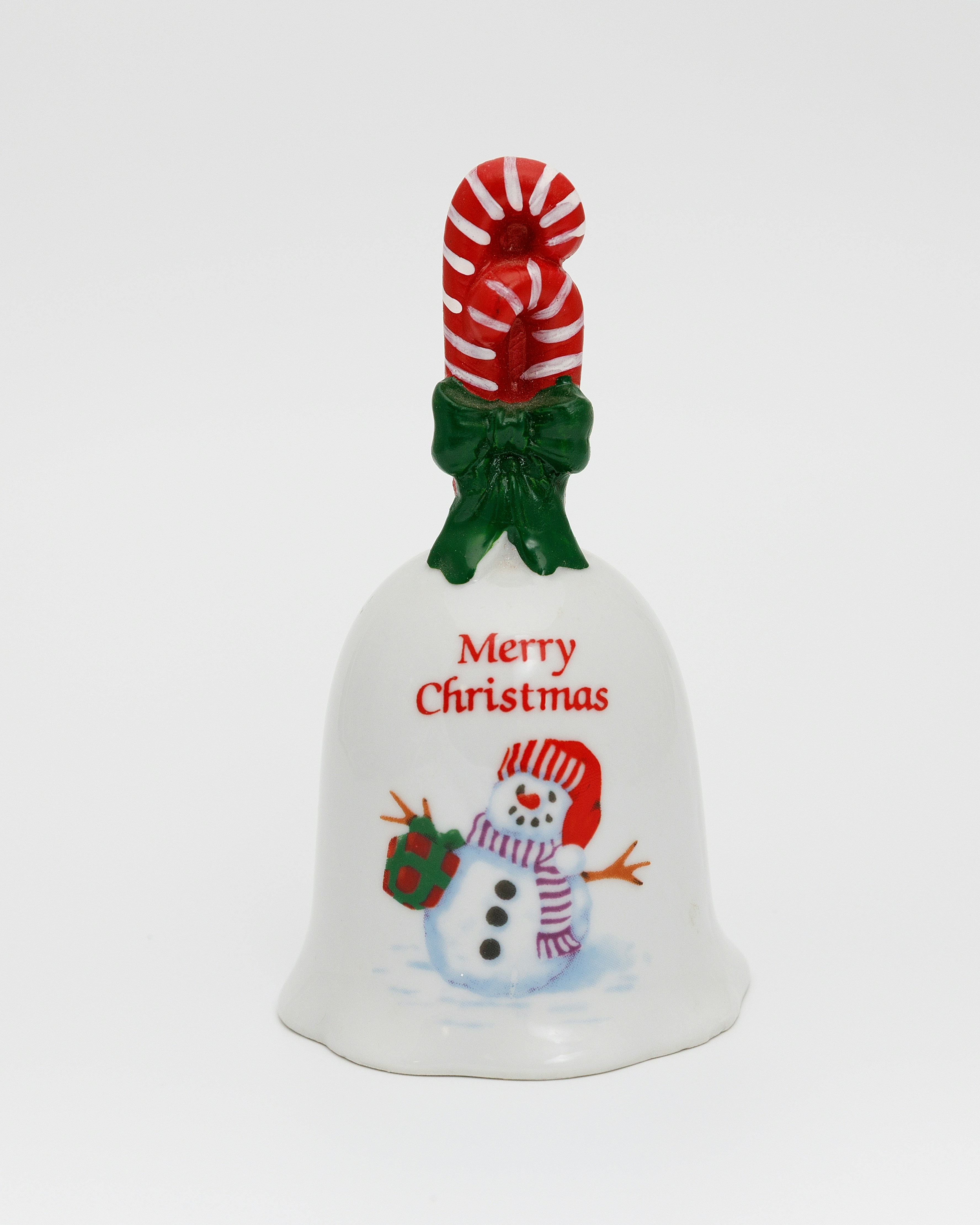 Candy Cane Bell: A Festive Snowman Figurine on White Silence