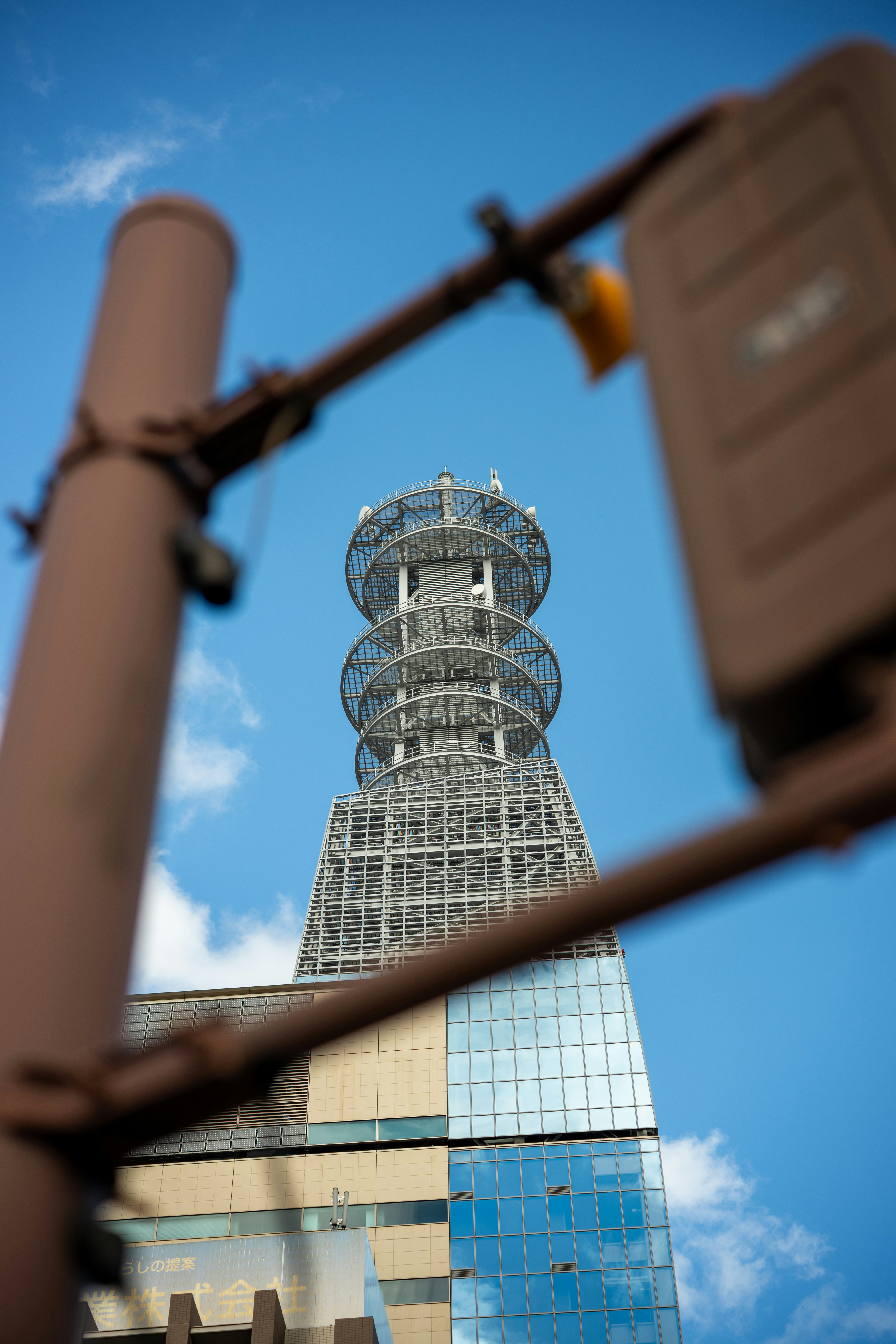 Through the Frame: The Tower Reaches Skyward