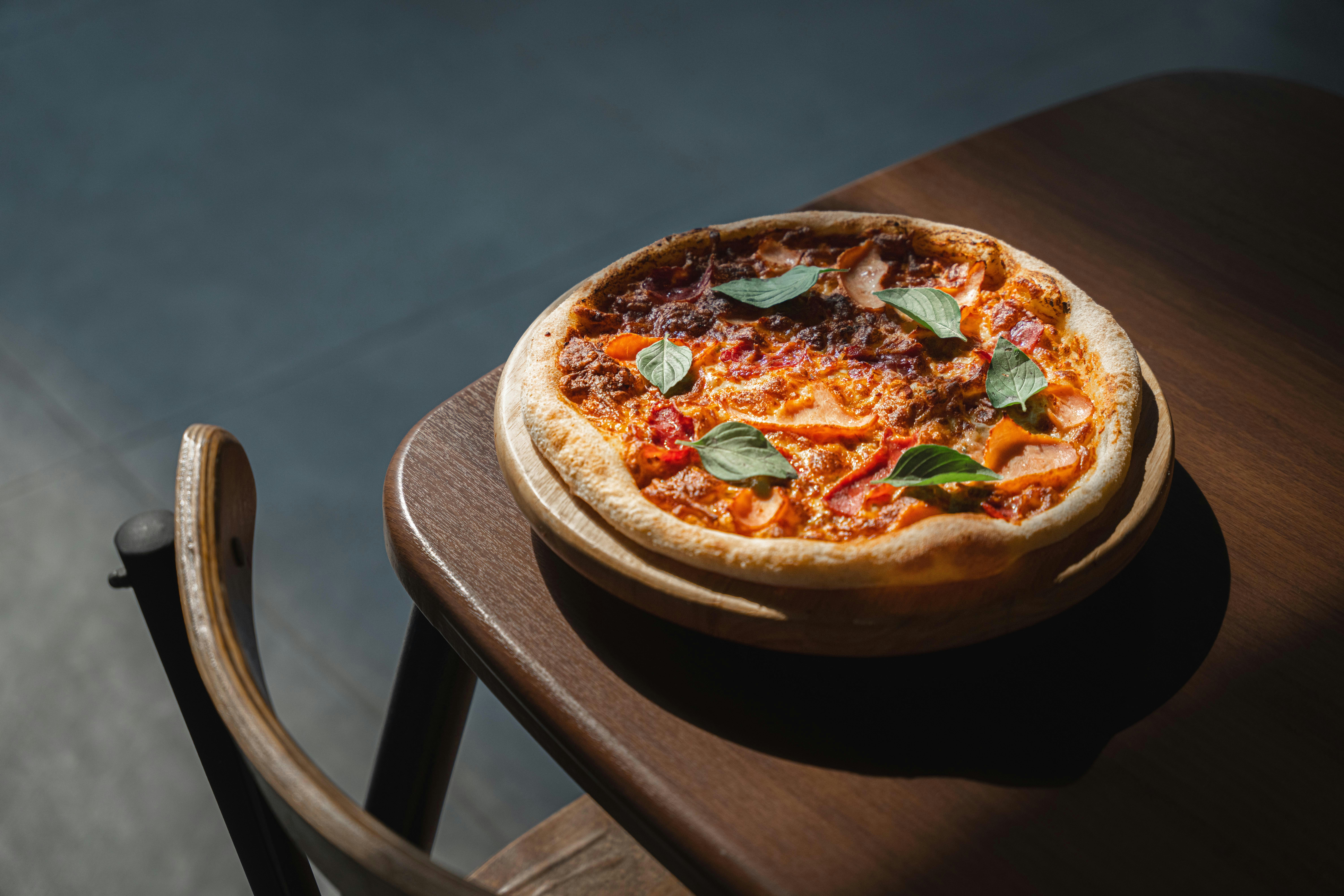 Sunlit Pizza on a Quiet Table