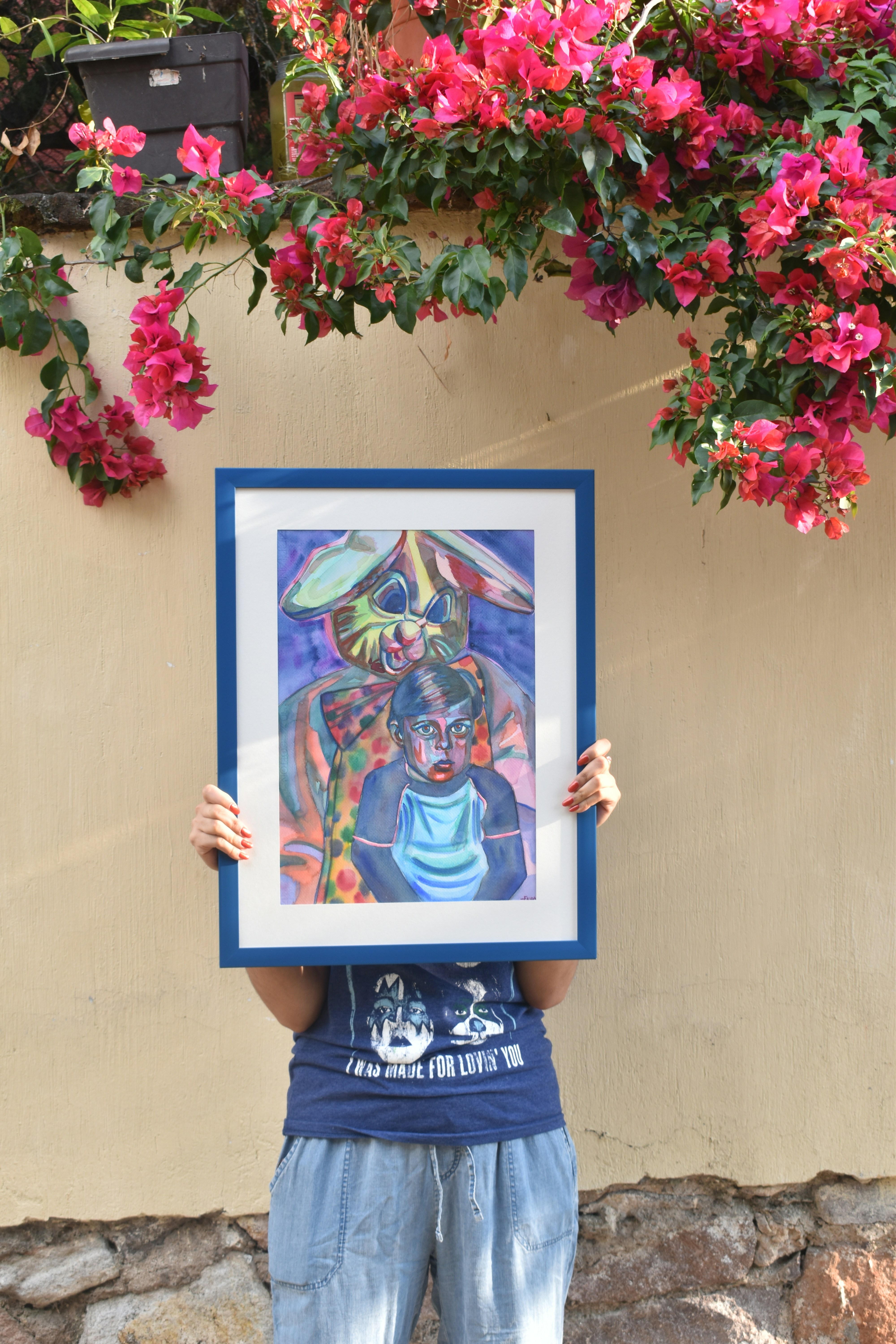 Framed Portrait Parade: A Figure Hides Behind Artful Fronding
