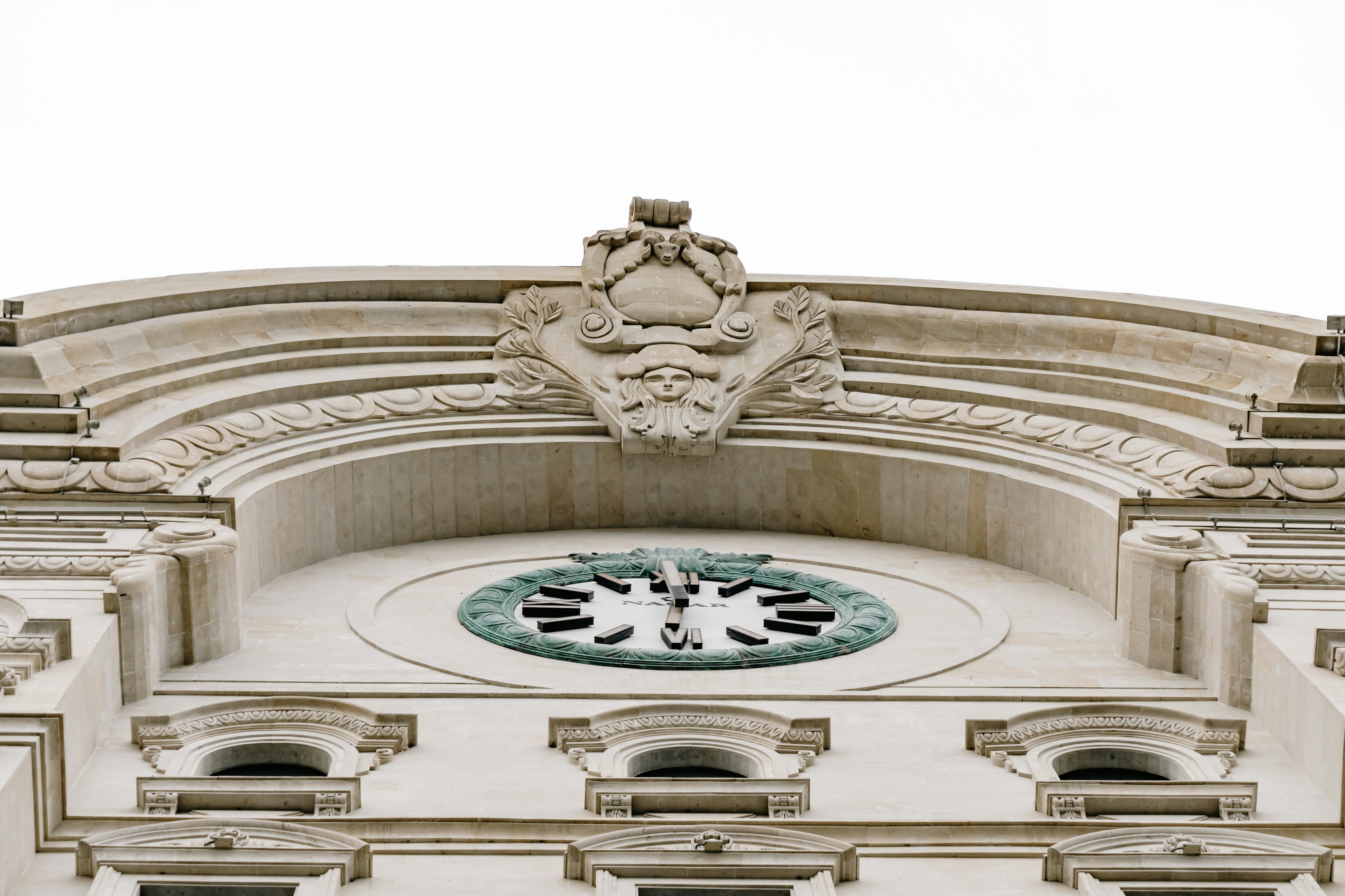 Ornamental Facade Crest Framing a Clock