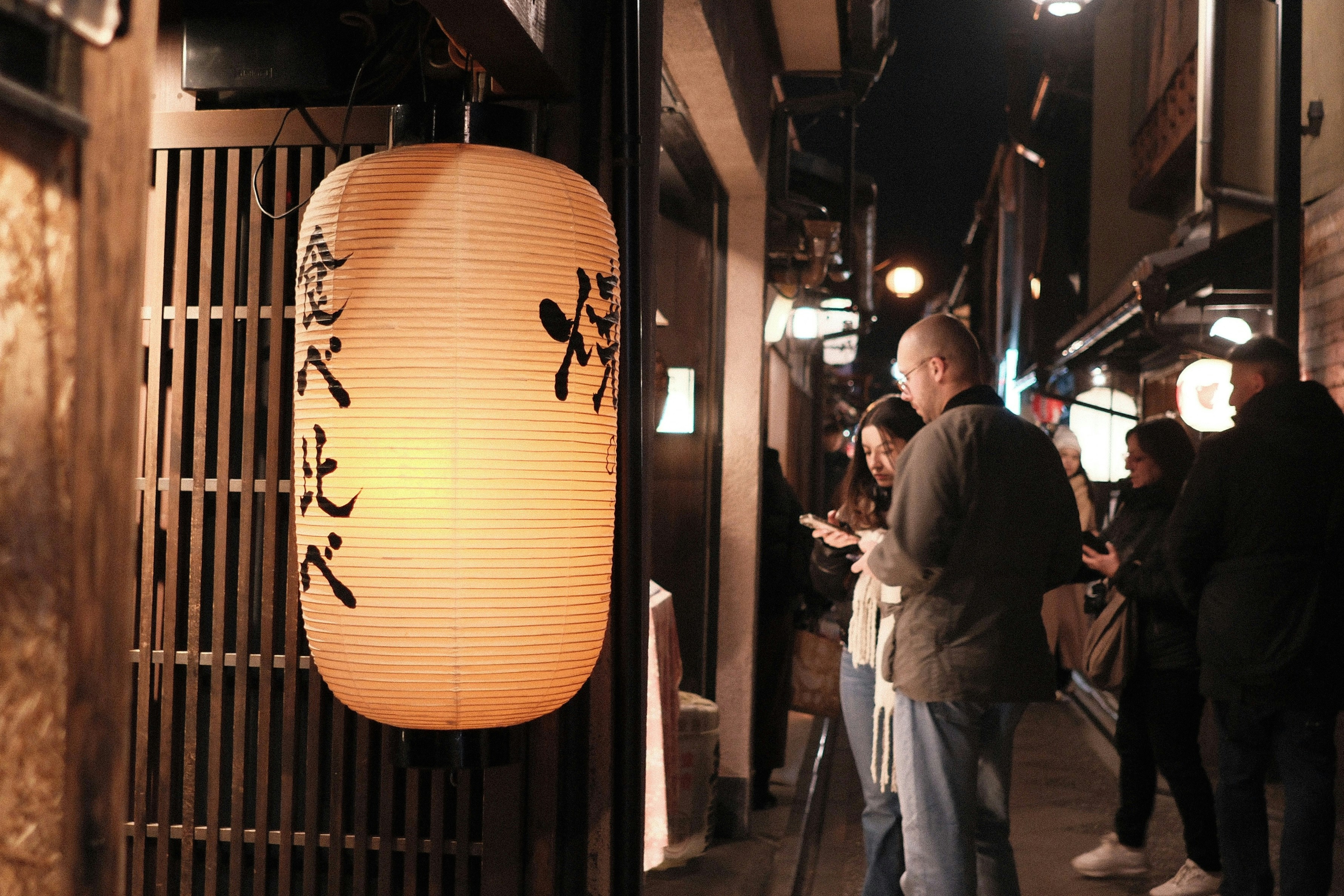 Lantern-lit Alleyway: Night Market Glow and Quiet Quarters