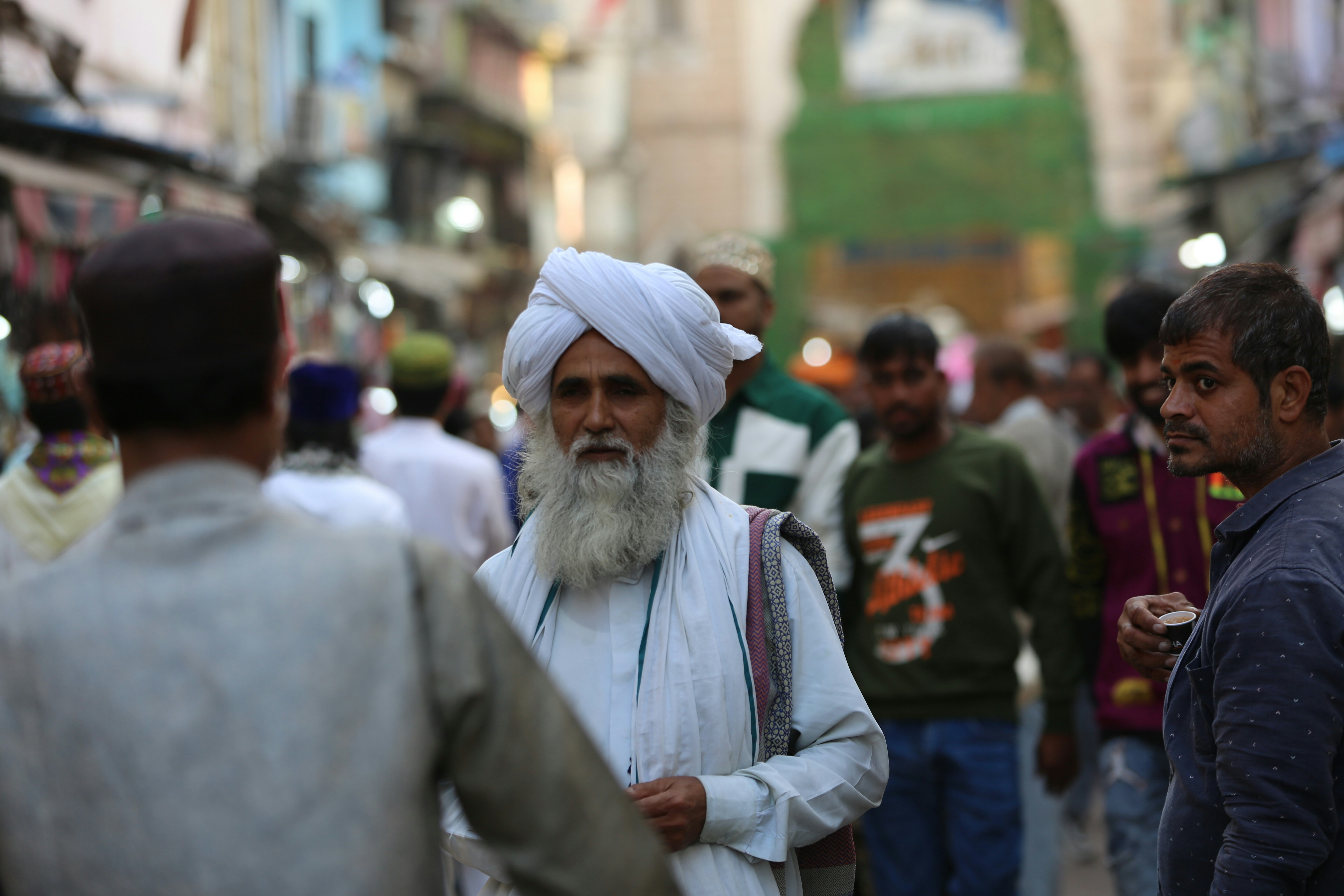 Elderly man with white turban and beard in crowd photo – Free People ...