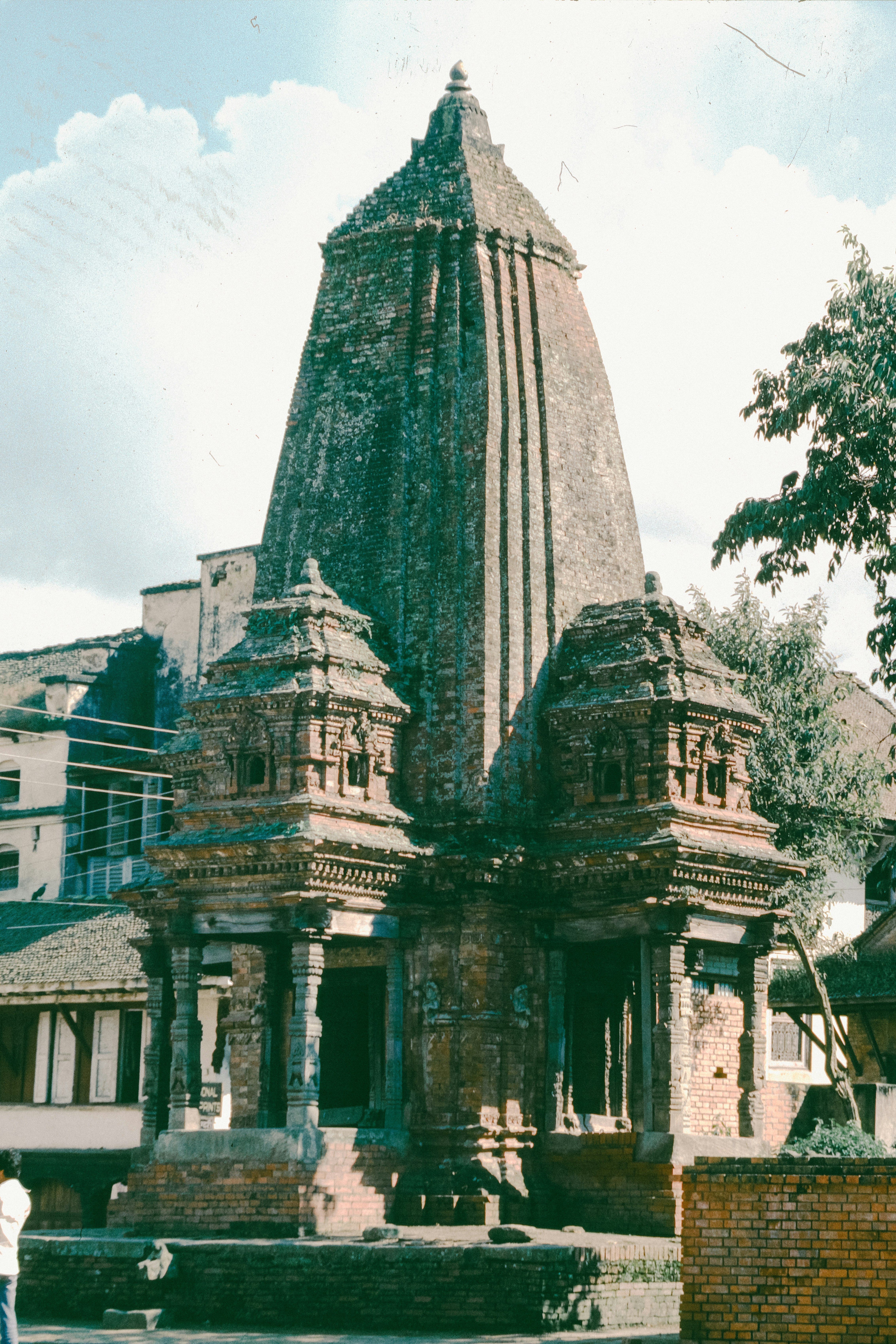 Temple Towers Reach Over Time: A Historic Facade in Weathered Brick