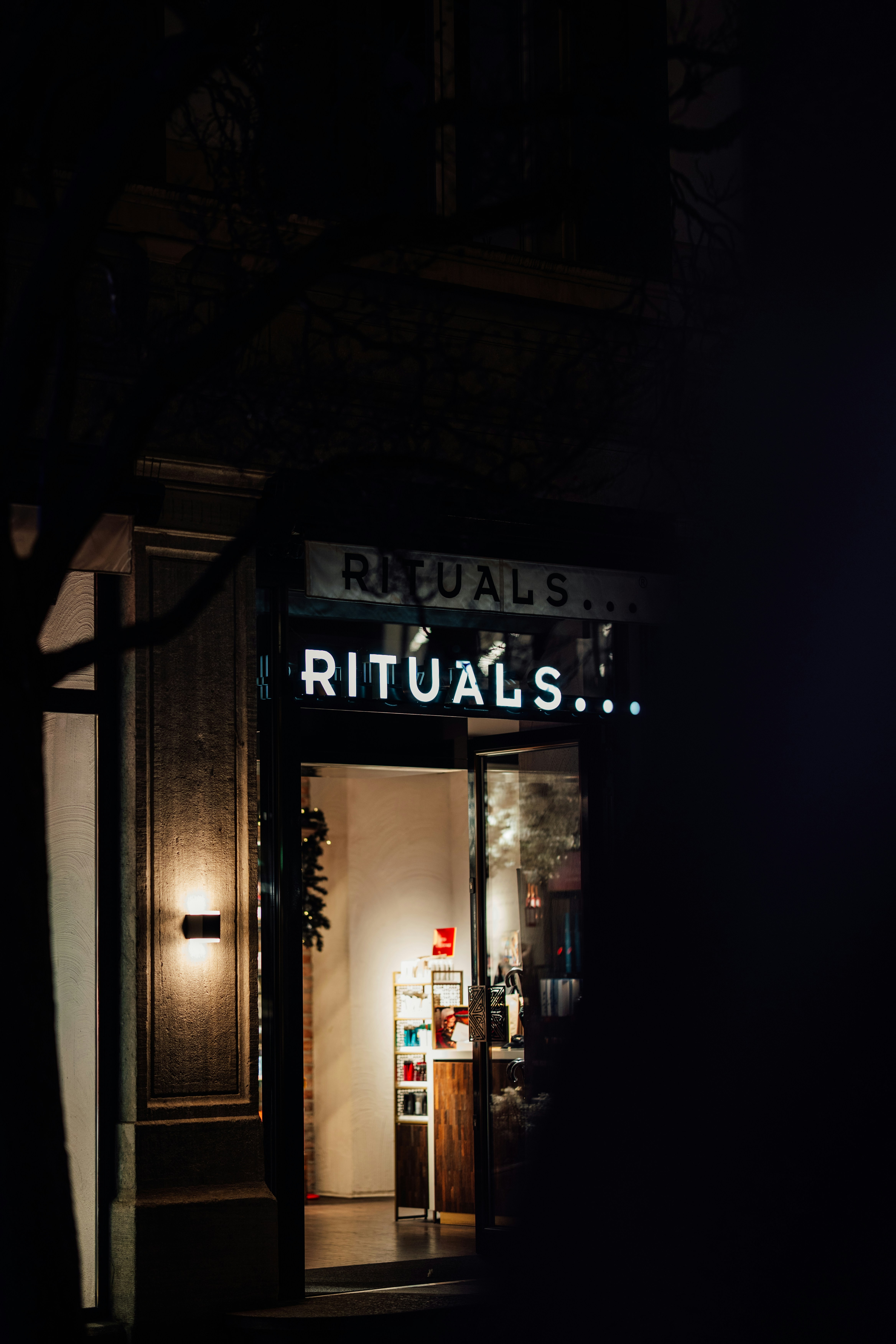 Rituals of Night: A Quiet Boutique Illuminated Through the Door