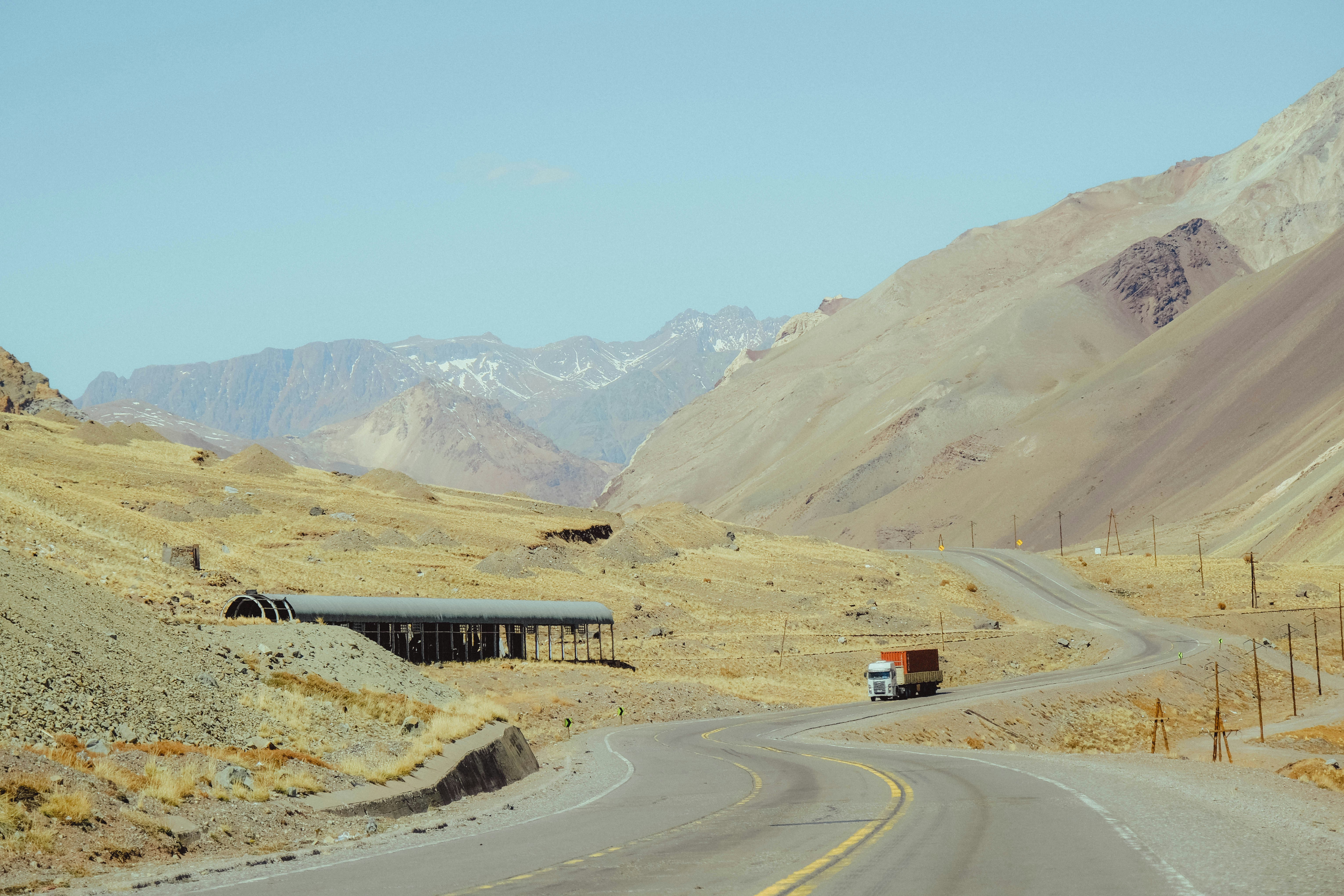 Desert Highway Toward the Distant Peaks